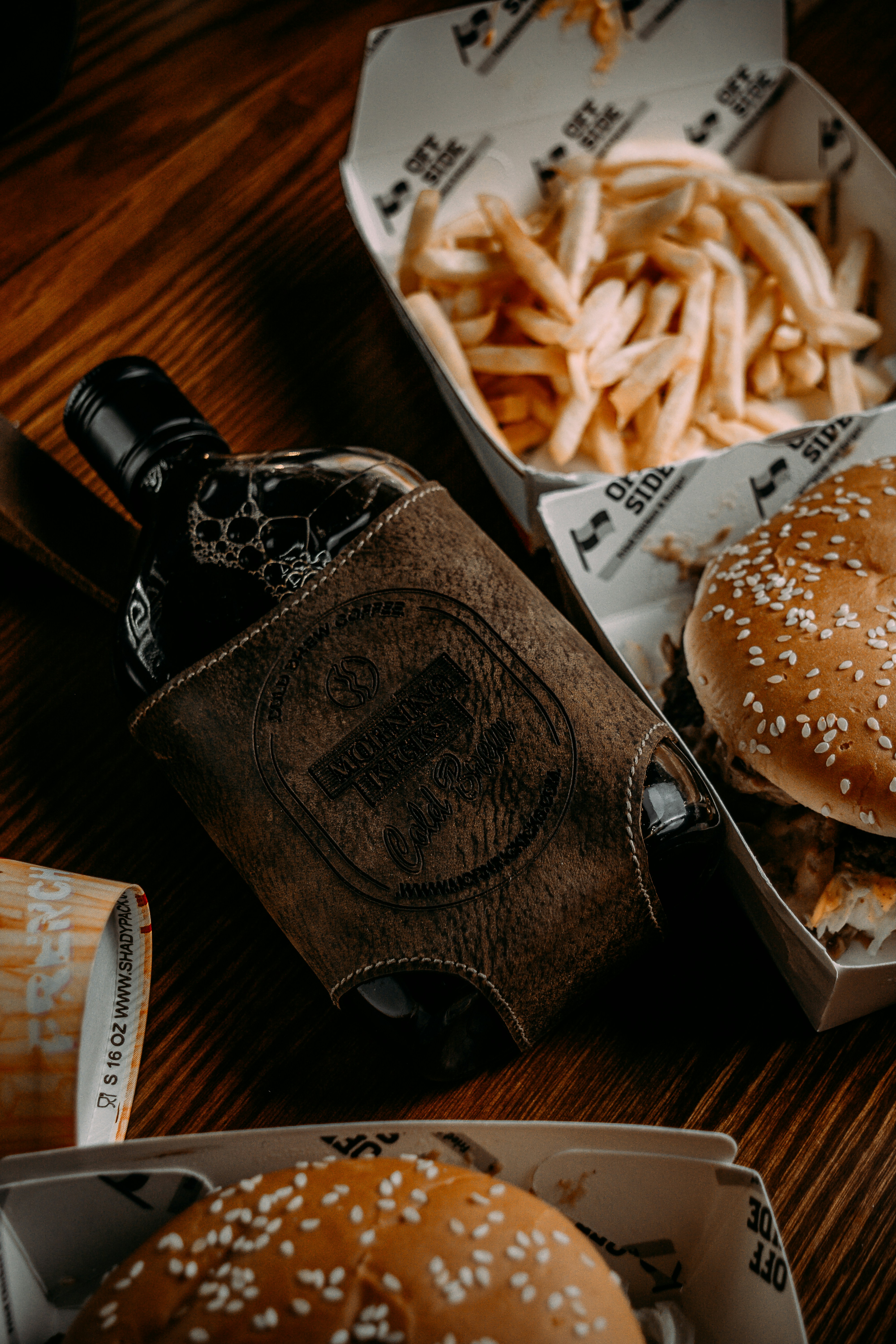 a couple of hamburgers and french fries on a table