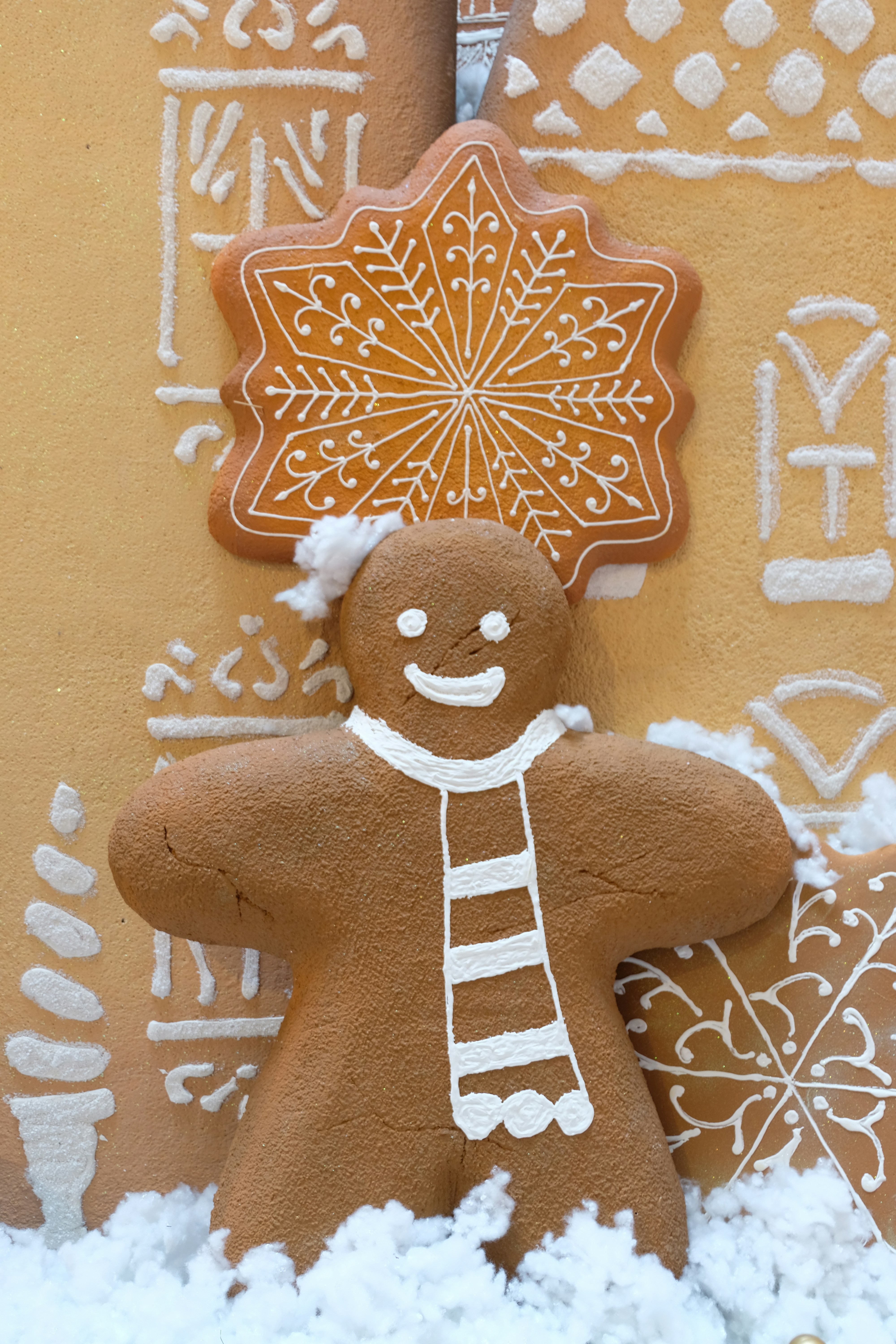 A gingerbread man is standing in the snow photo – Free Food Image on ...