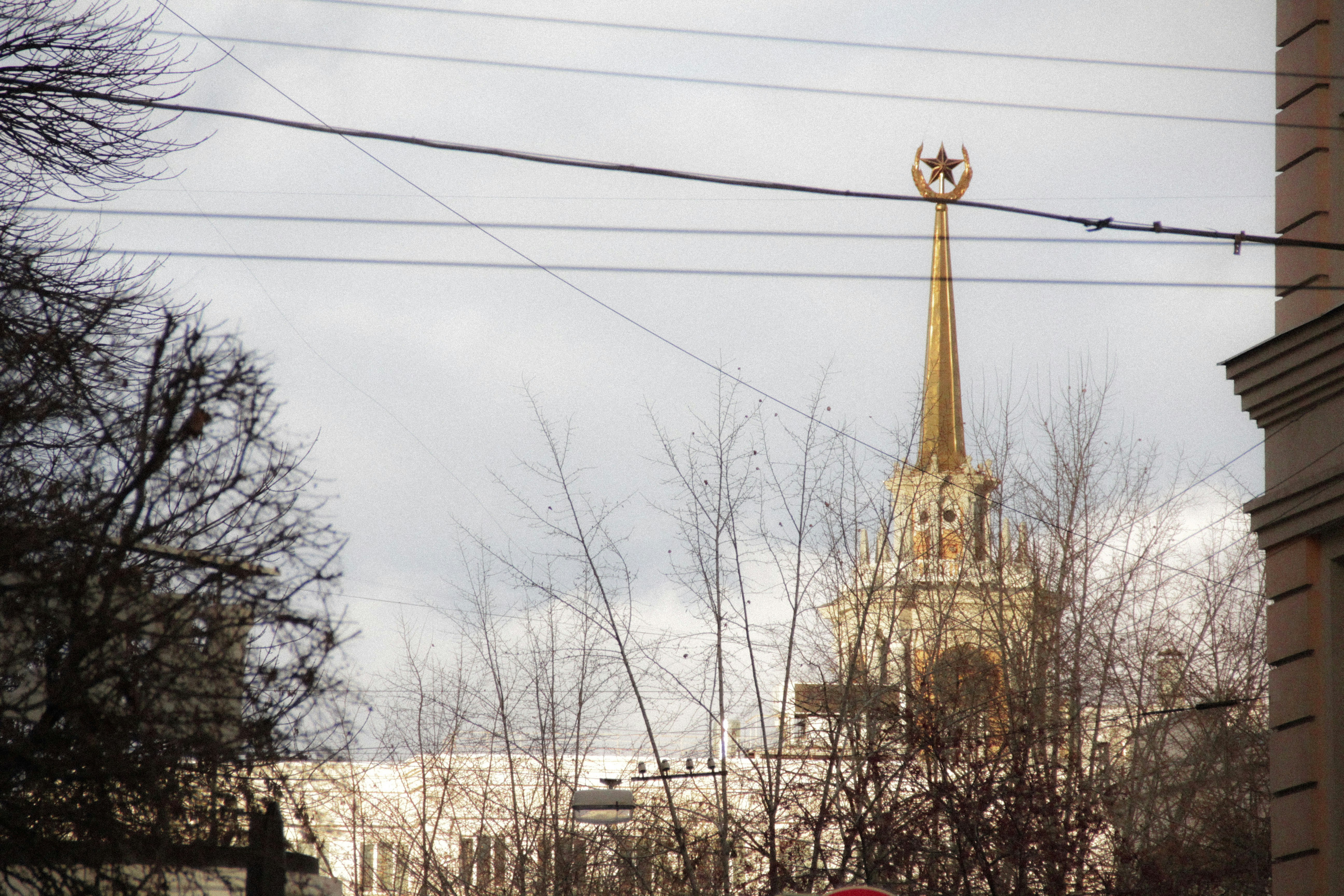 a tall building with a spire on top of it