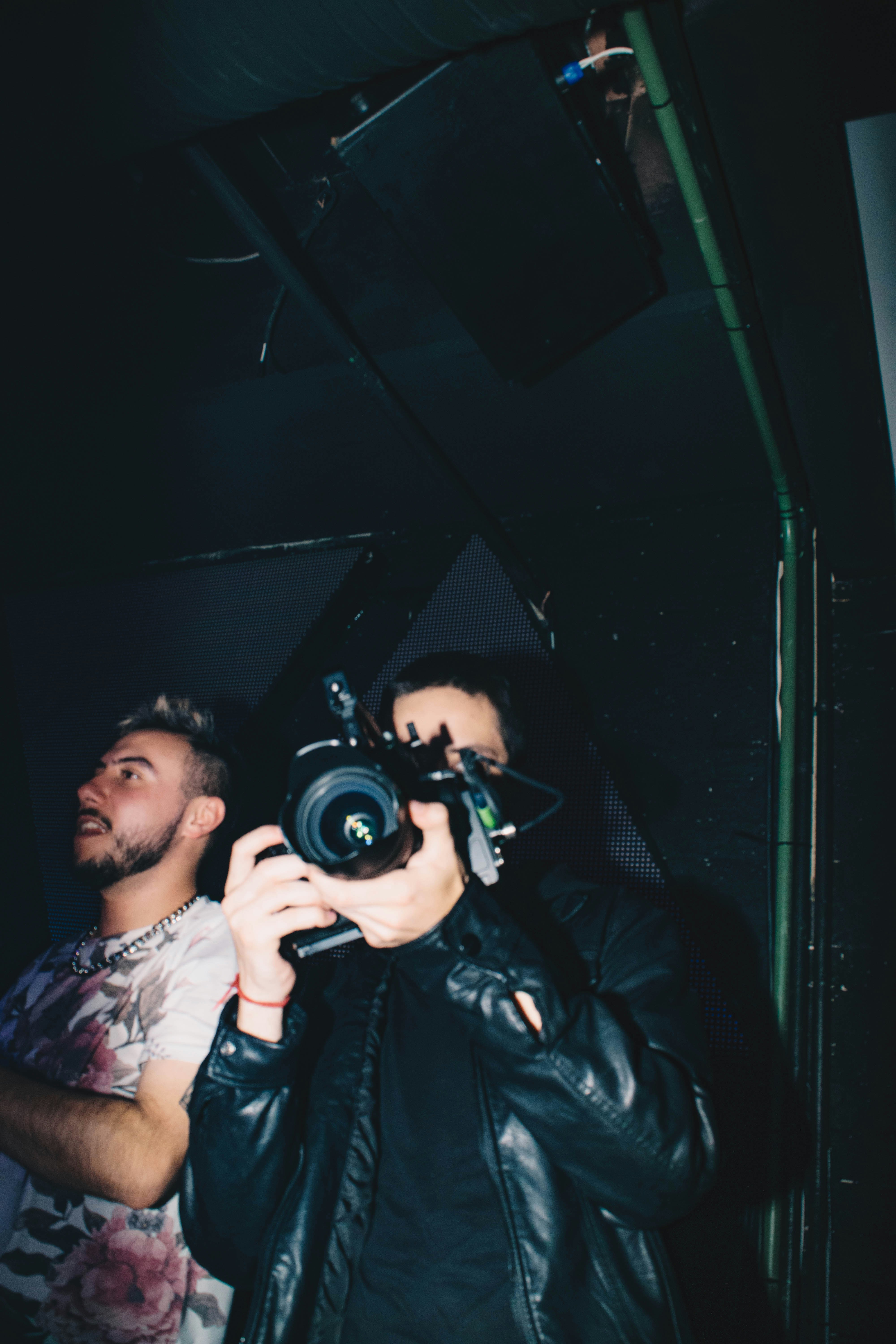a man taking a picture of himself with a camera