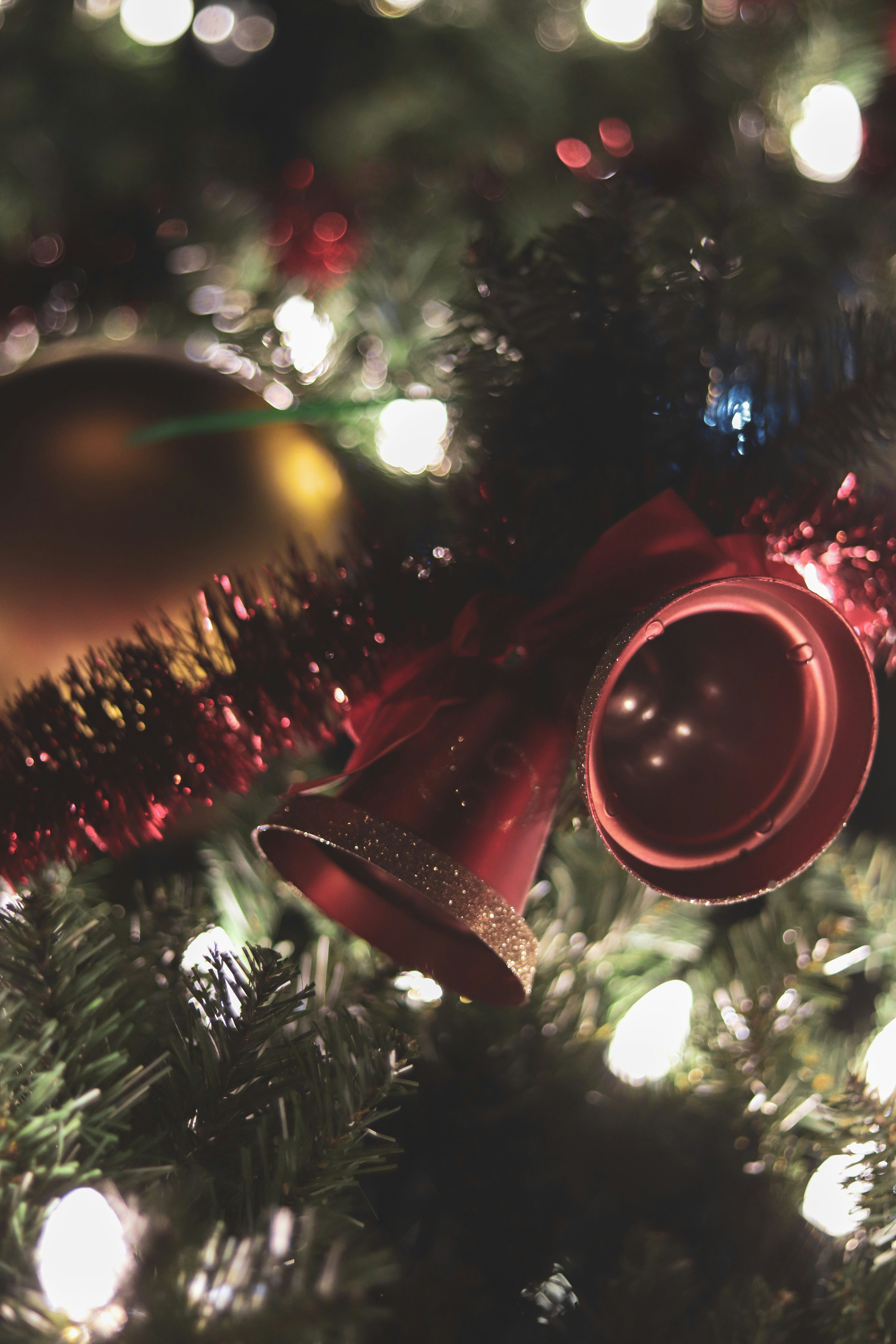 Crimson Bell in a Halo of Christmas Lights