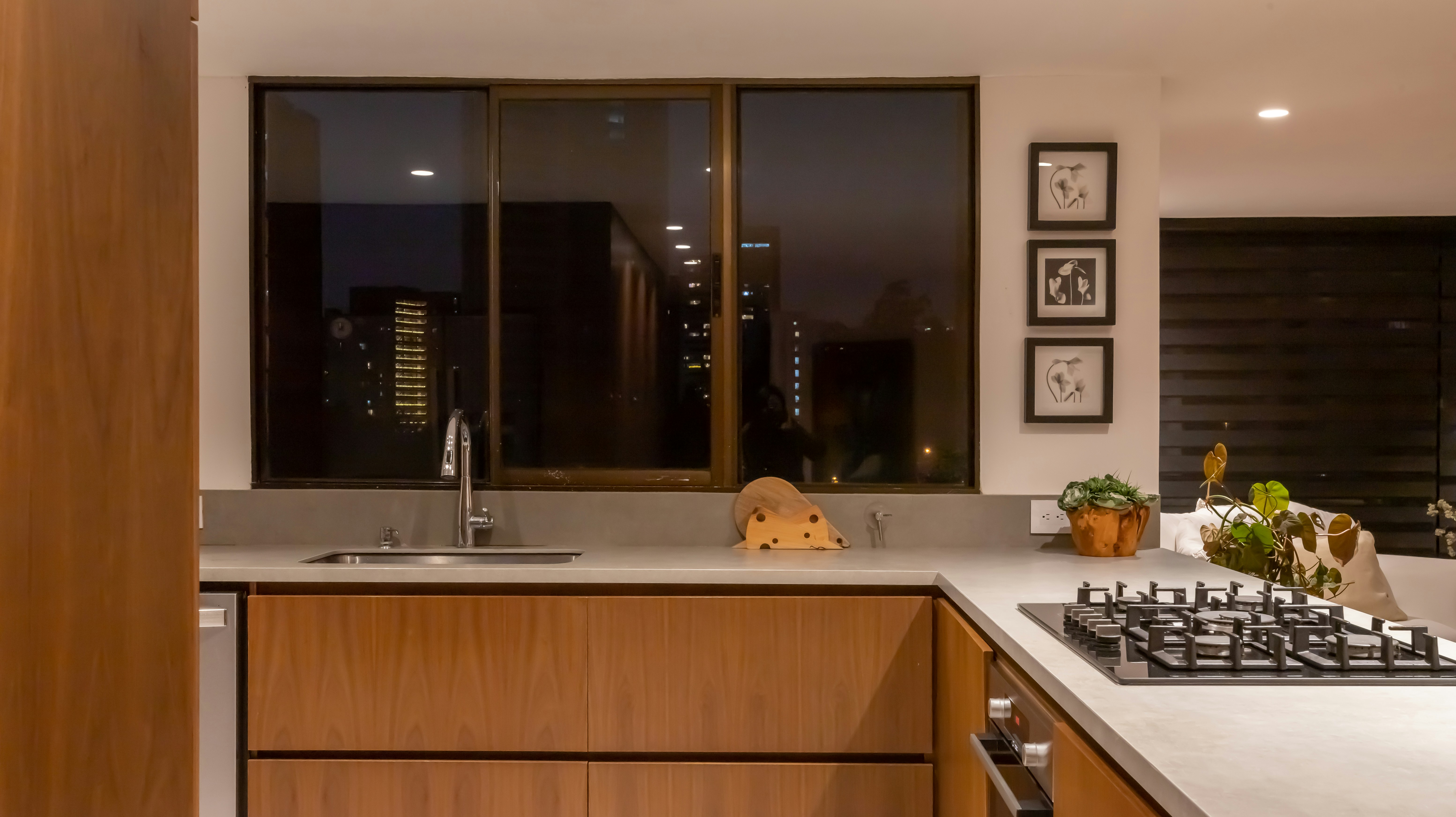 A kitchen with a stove top oven next to a window photo – Free Indoors ...