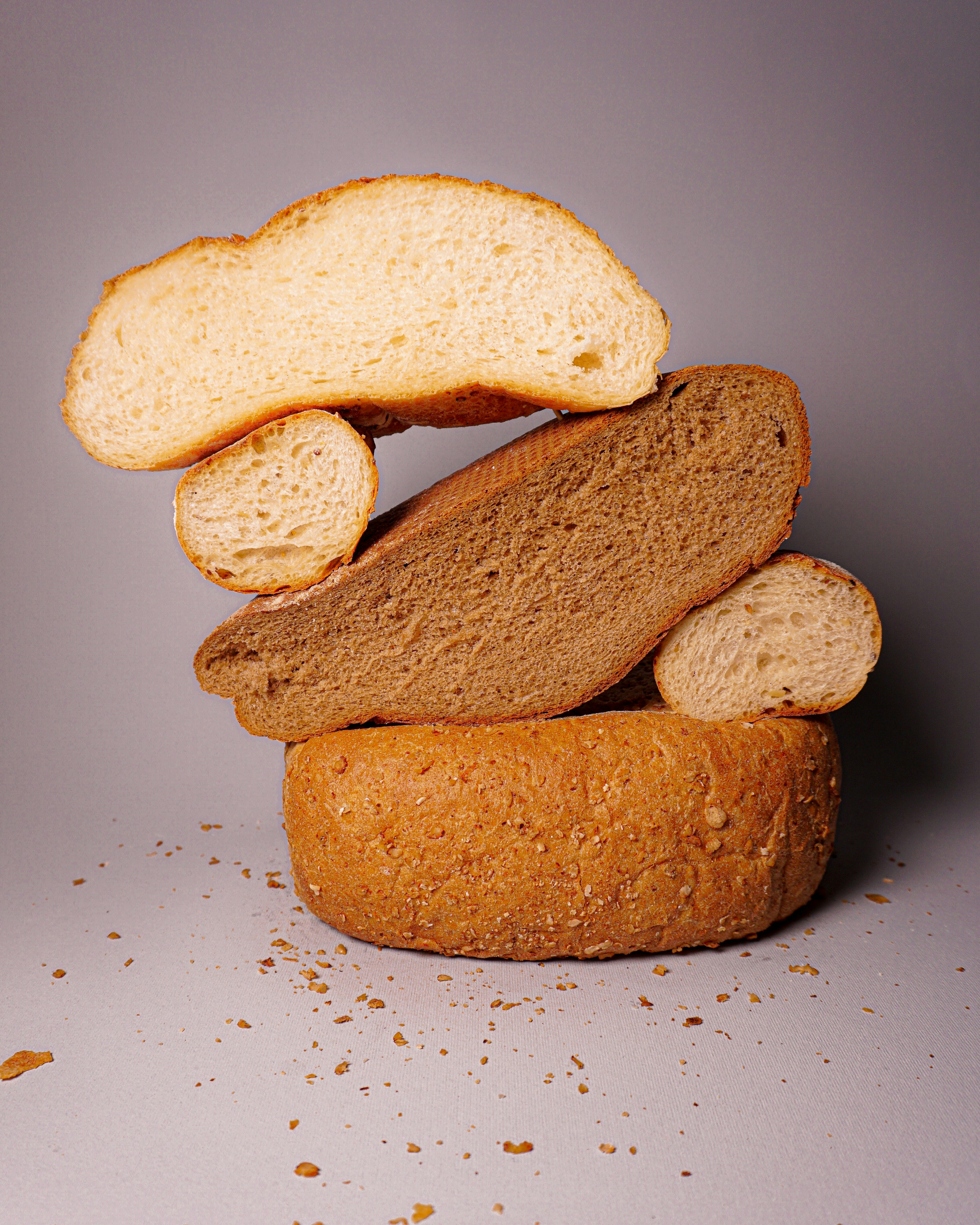 A pile of bread sitting on top of each other photo – Free Bread Image ...