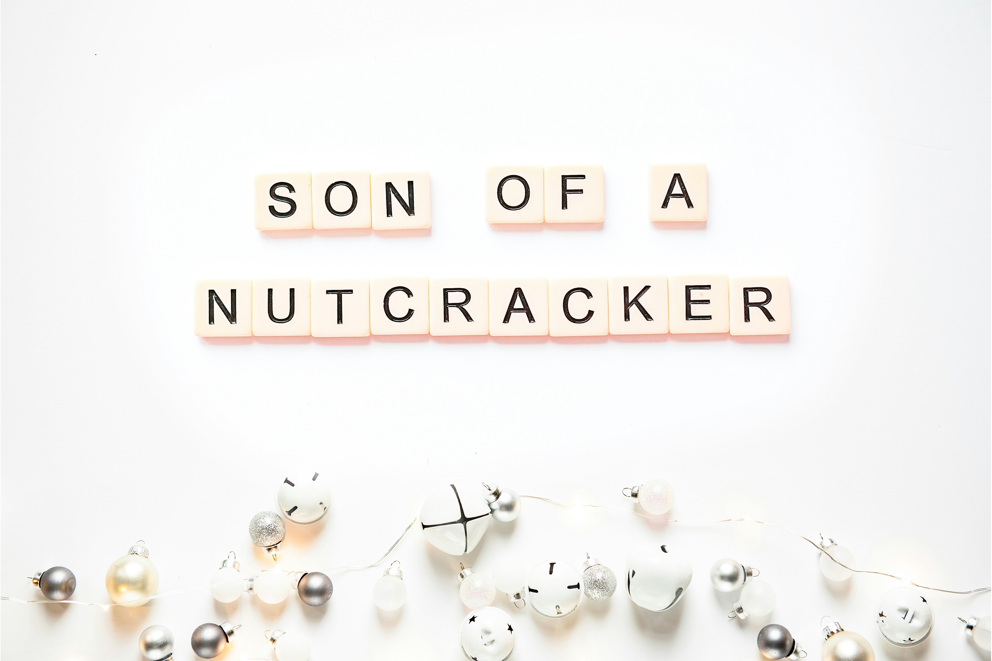 A scrabble type scrabble with the words son of a nutcr photo – Free ...