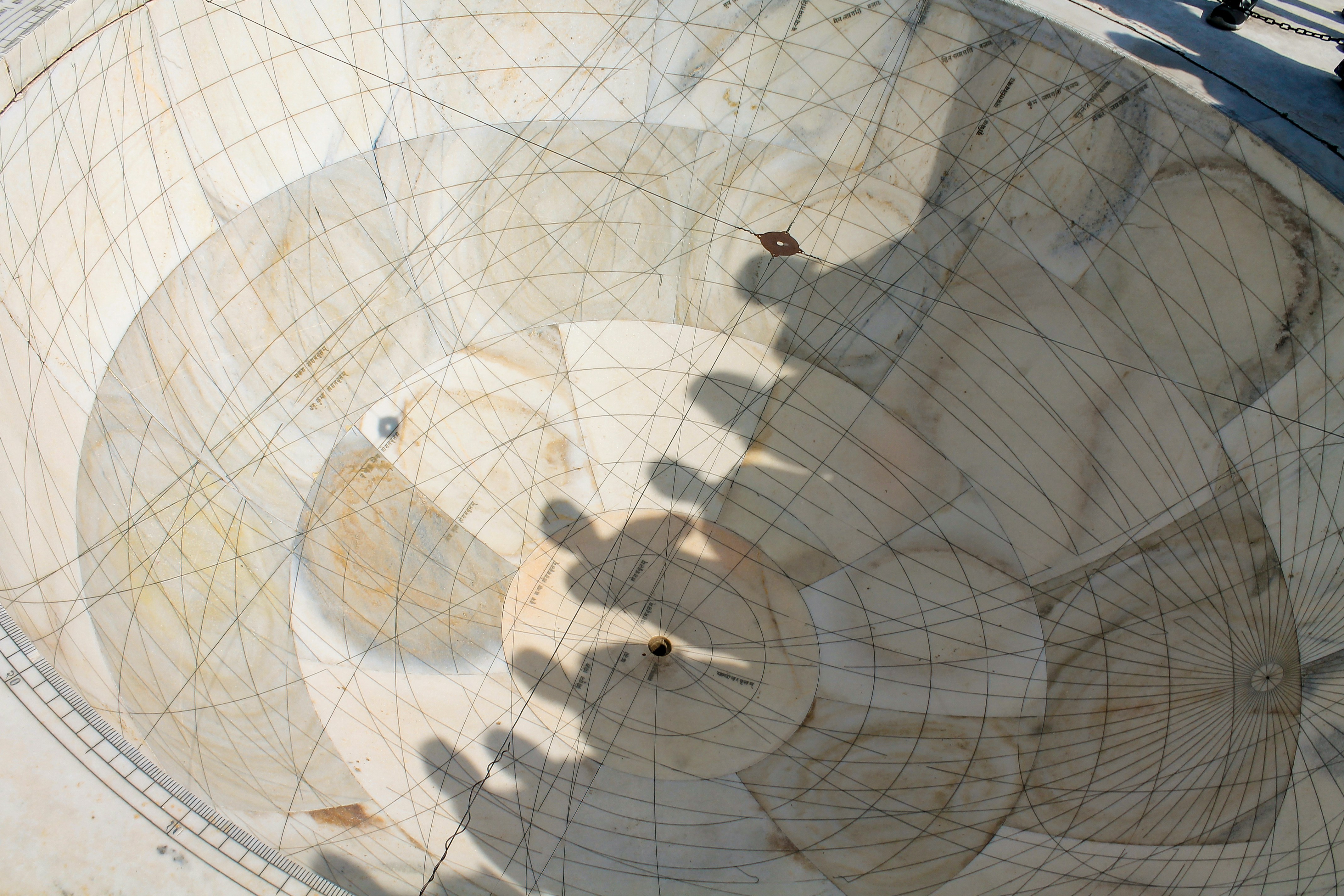 Silhouette at the Core: Shadows on a Giant Parabolic Disk's Concentric Rings