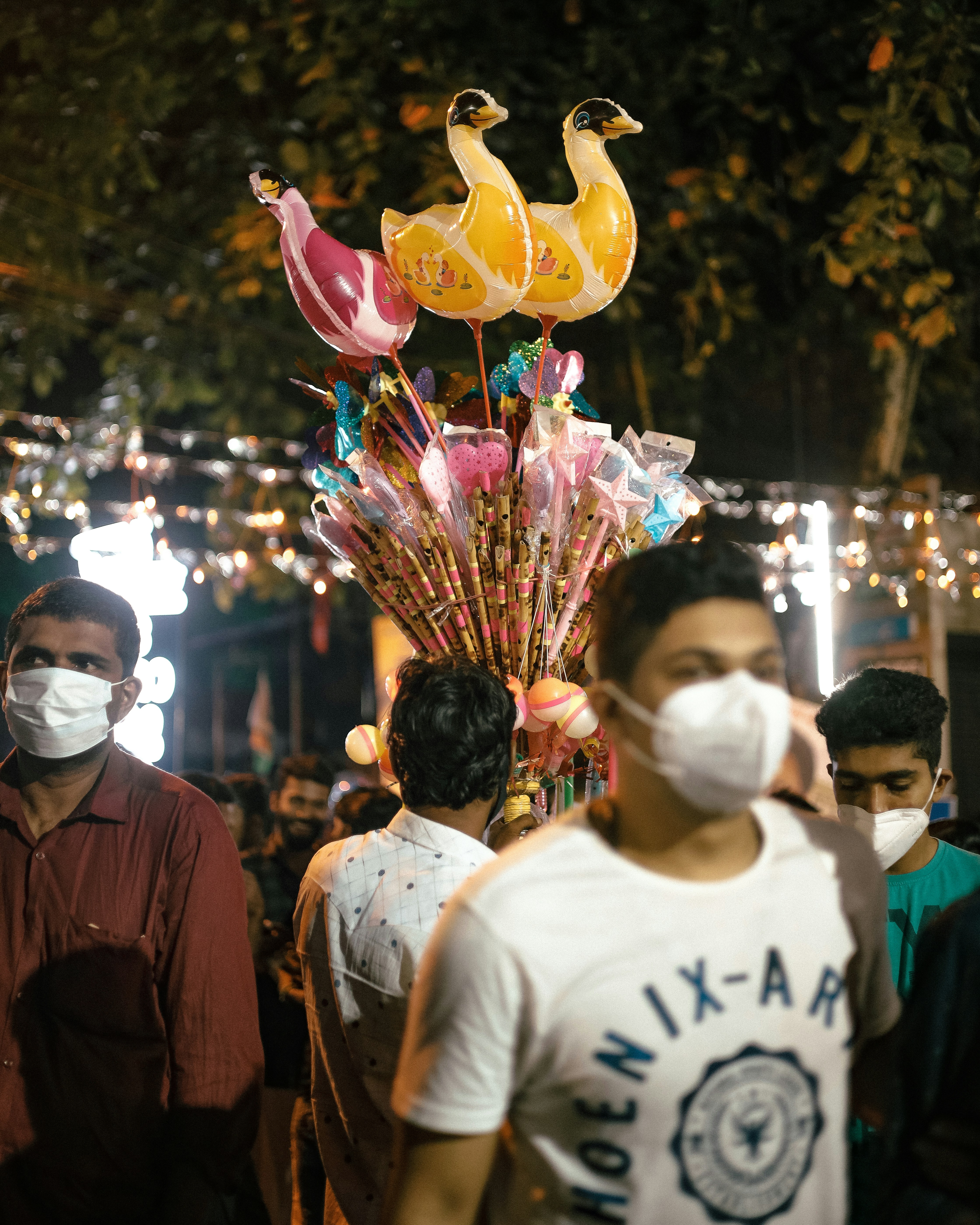 Candy Swirl at Dusk: Lanterns, Masks, and a Carnival Crowd