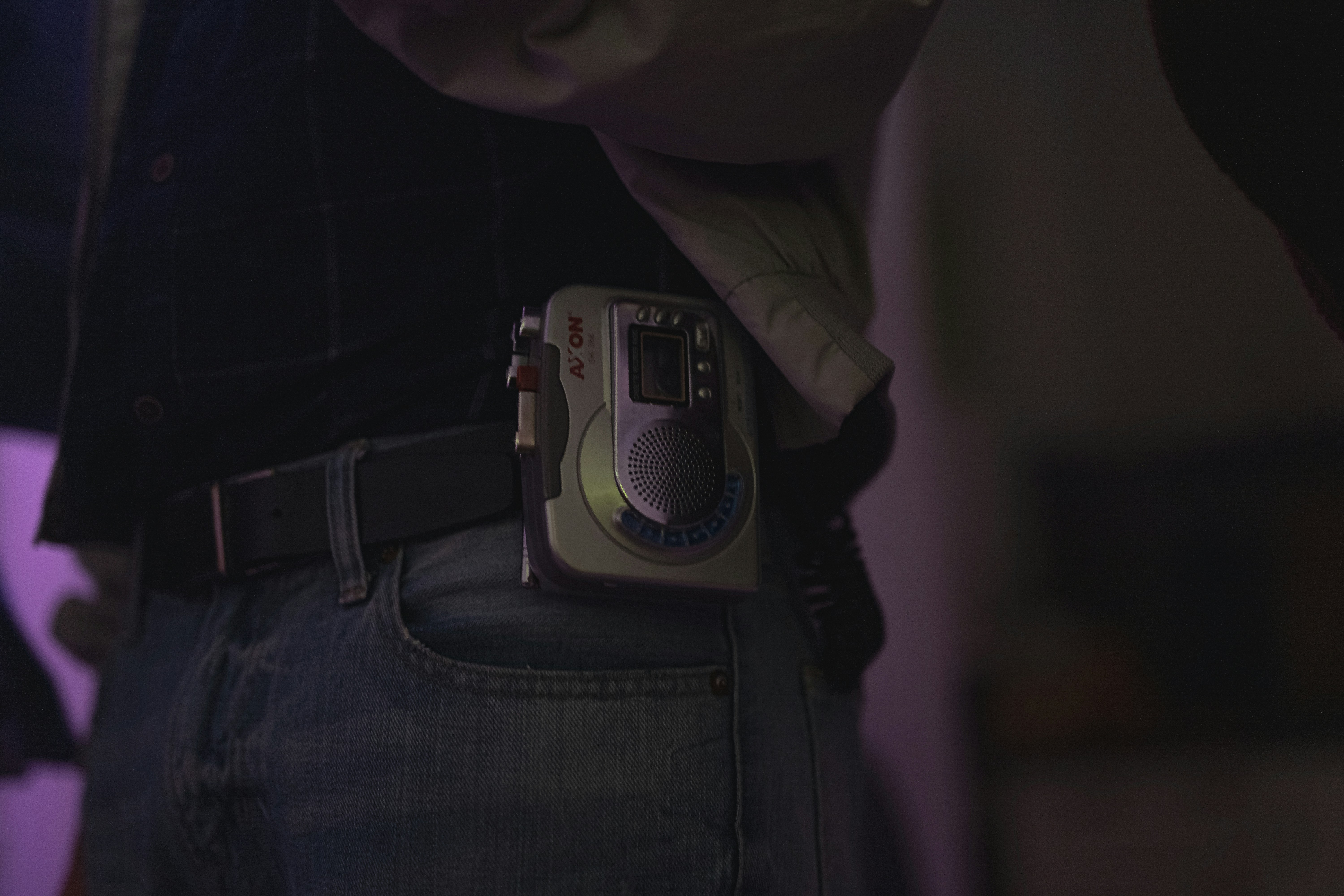 Denim Lumen: A Pocket Camera Peek in Purple Night