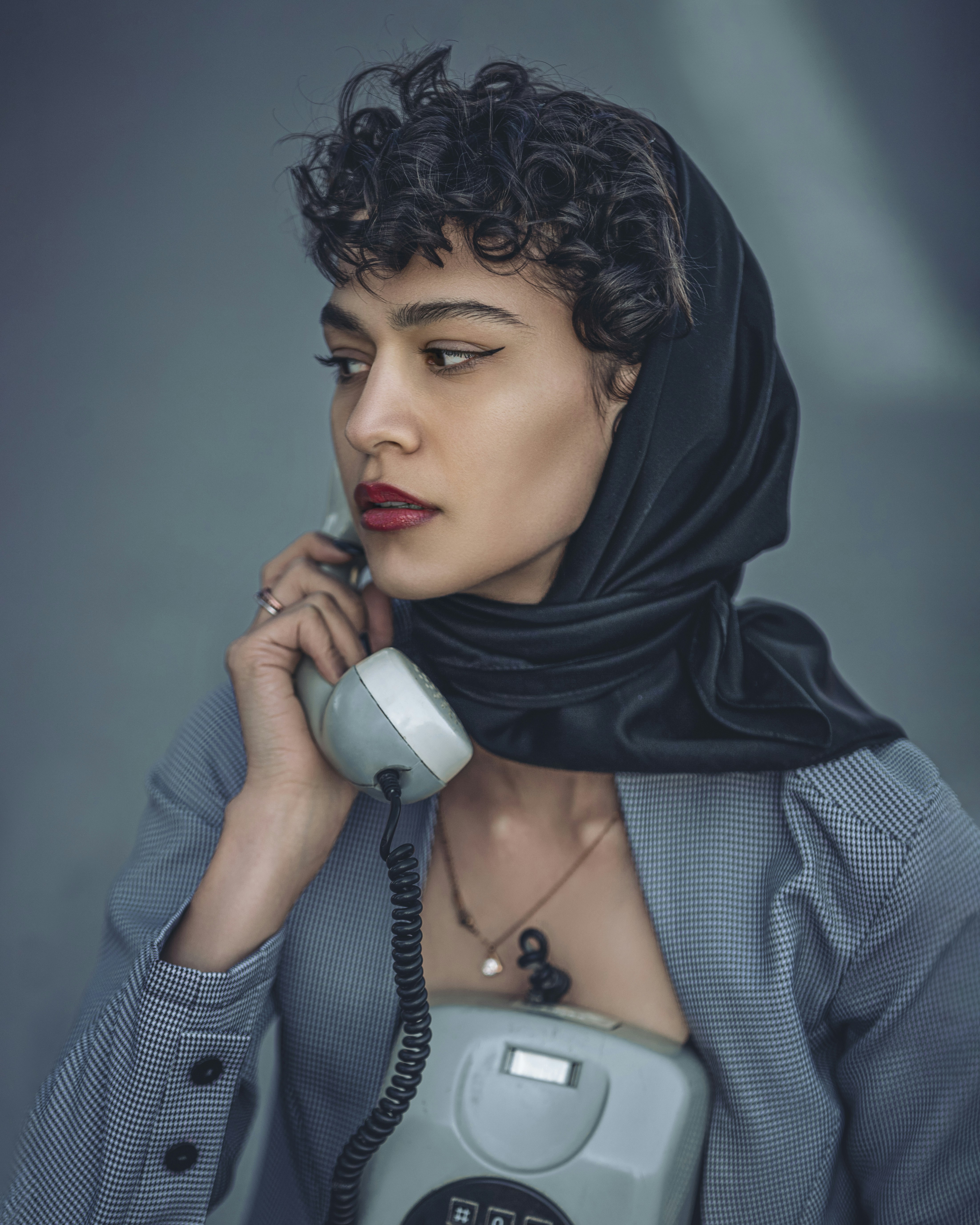 Echoes on the Line: A Velvet-Headscarf Portrait with a Vintage Phone