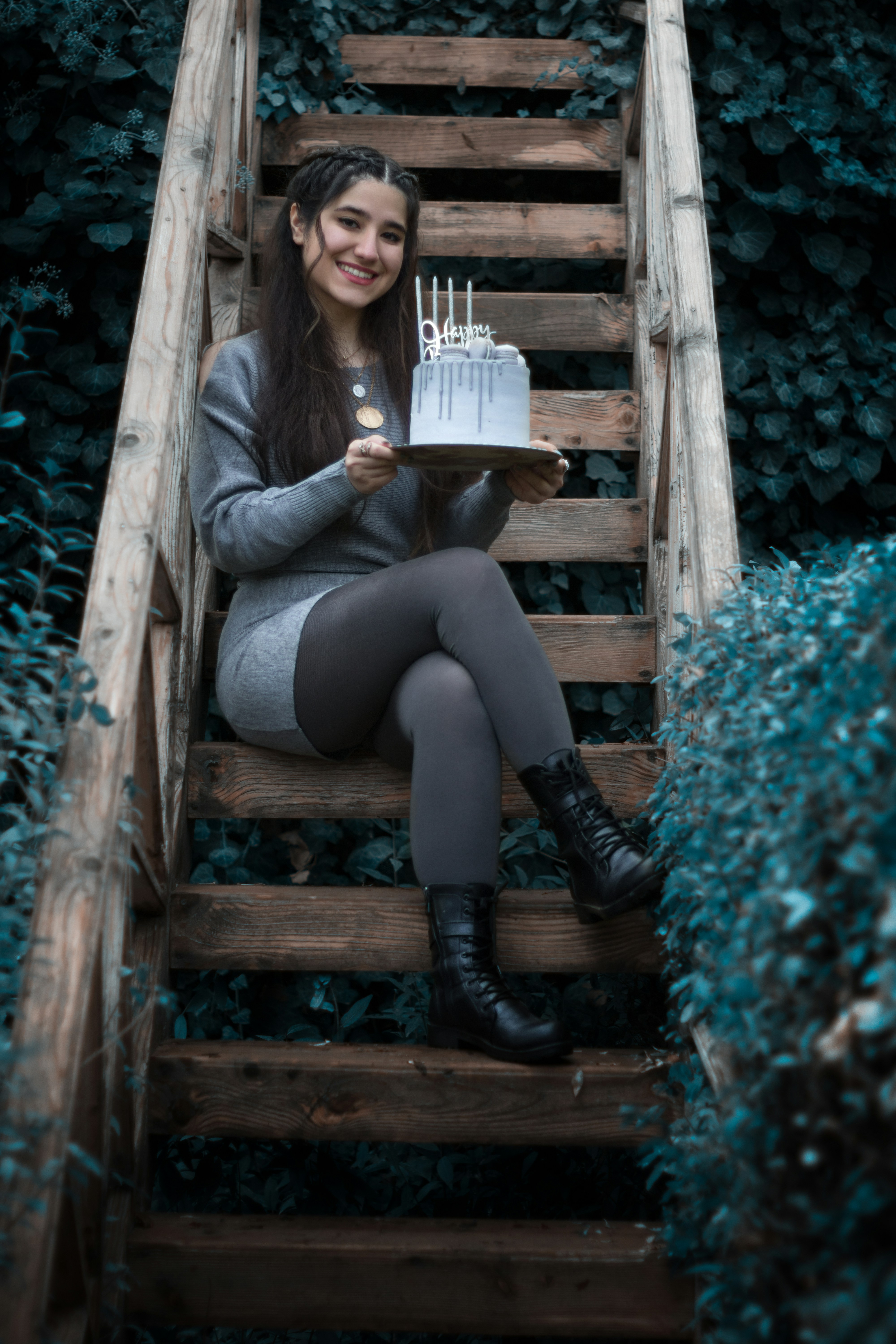 Candles on the Stairs: A Birthday Moment Framed by Ivy