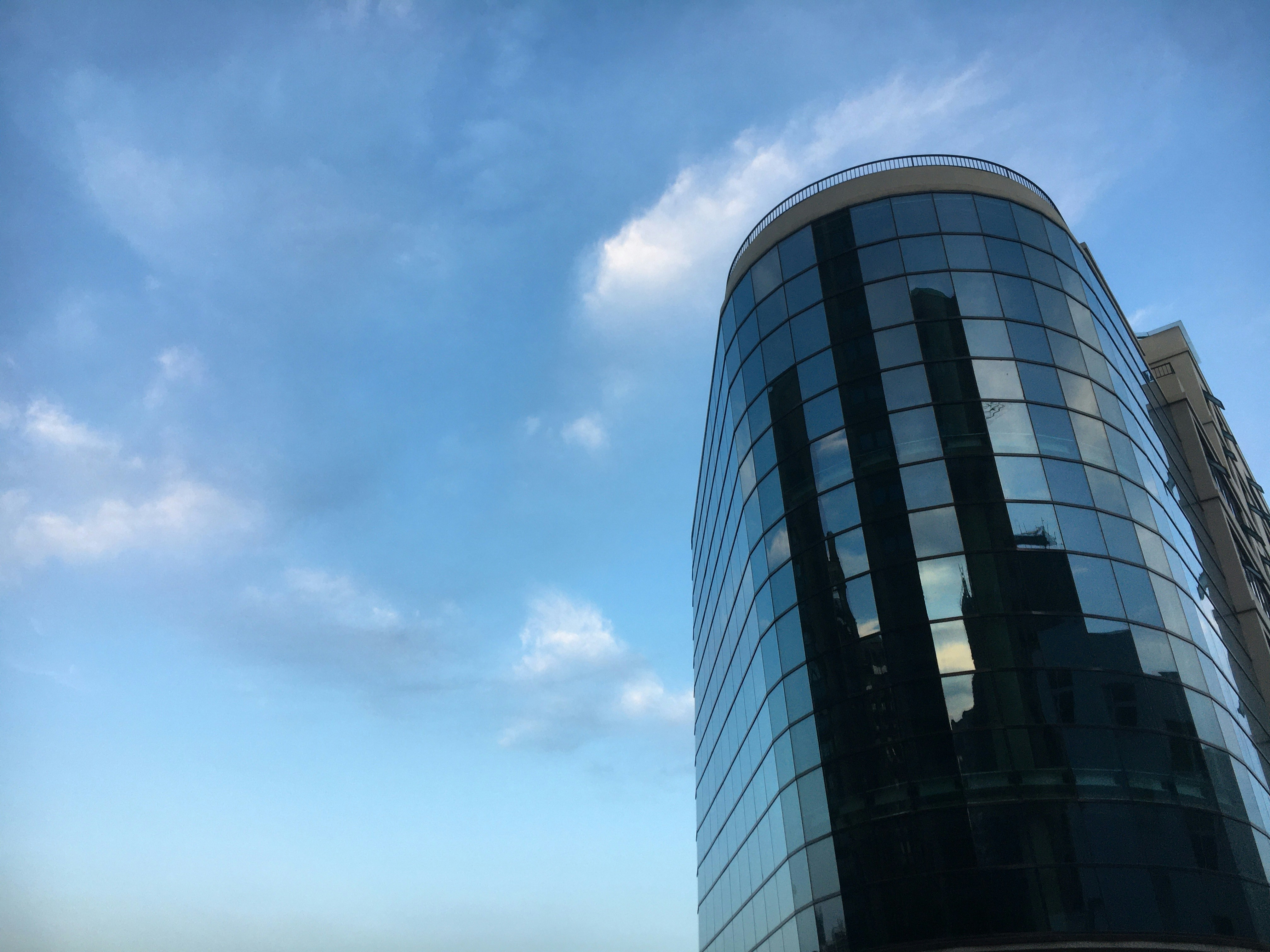 A very tall building with a lot of windows photo – Free Building Image ...