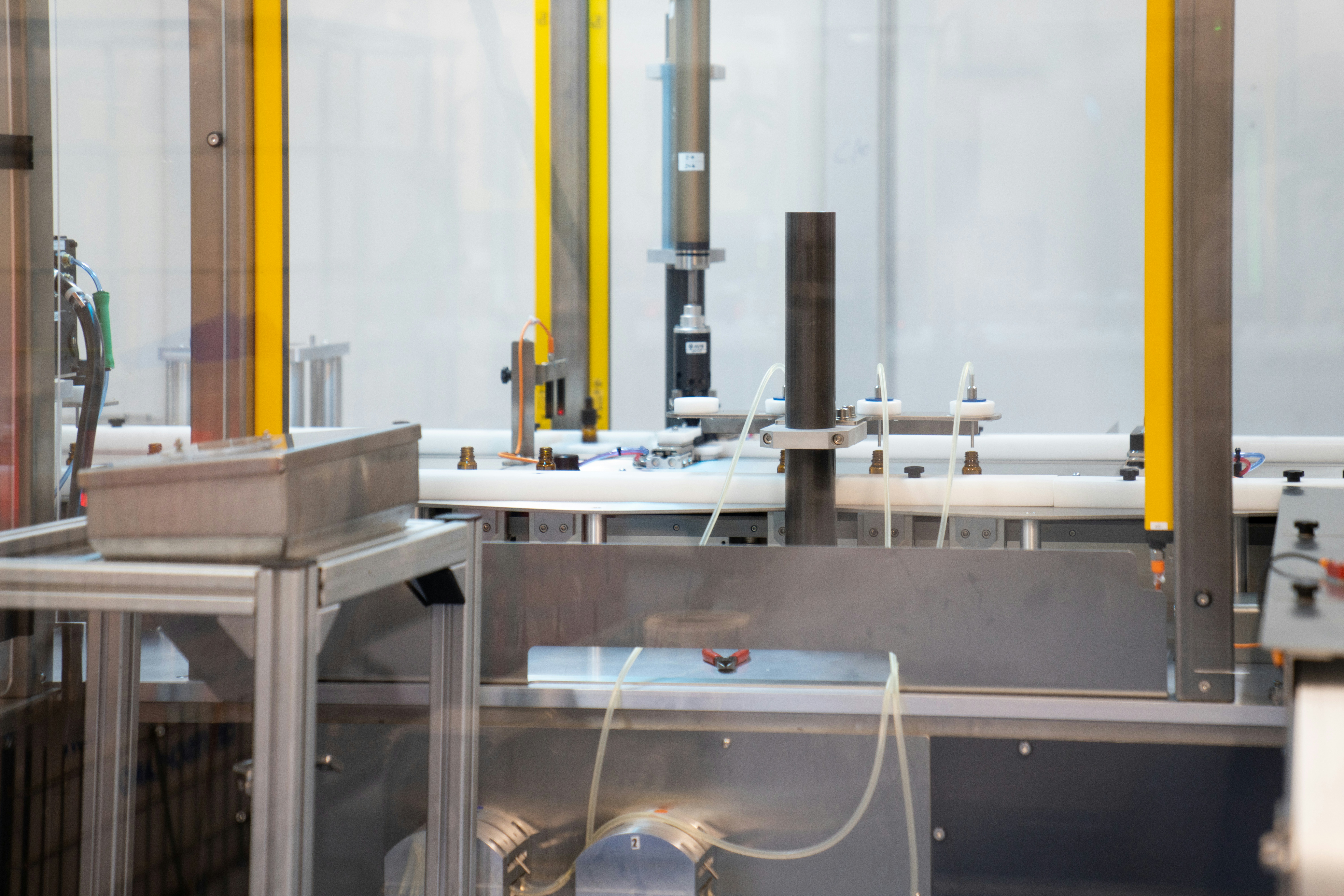 A machine that is sitting inside of a building photo – Free Cbd oil ...