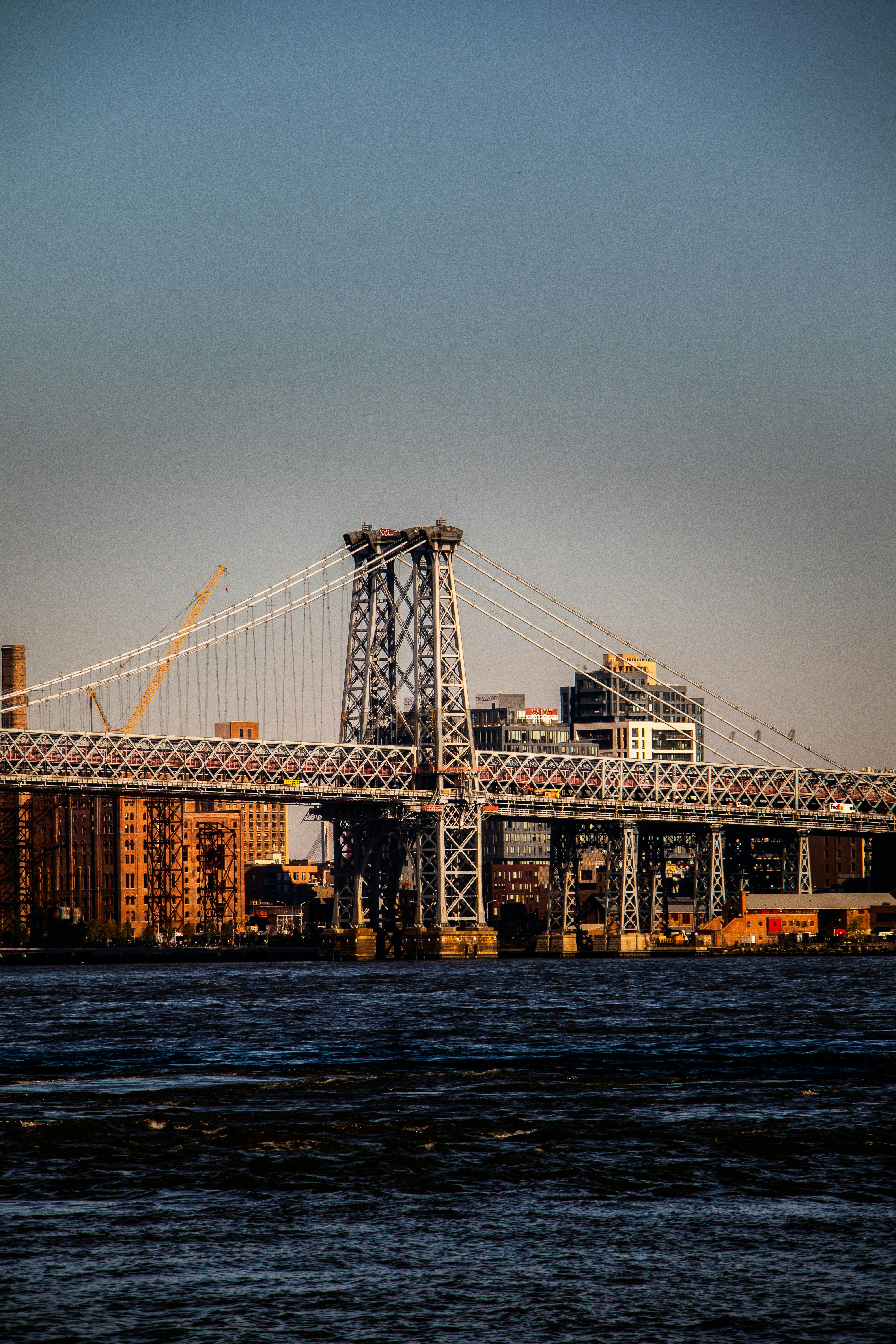 A large bridge spanning over a large body of water photo – Free ...