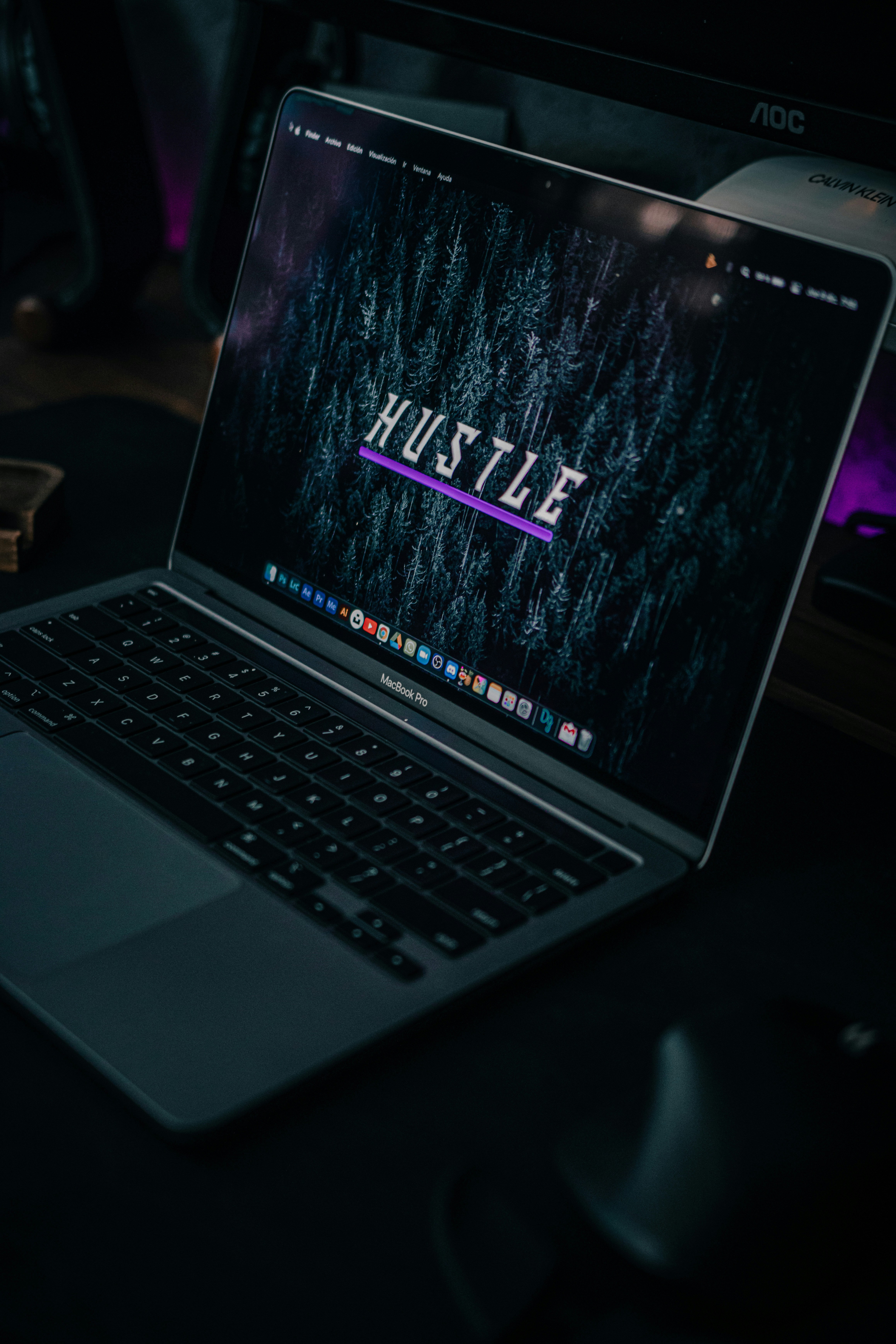 A laptop computer sitting on top of a desk photo – Free Macbook pro ...