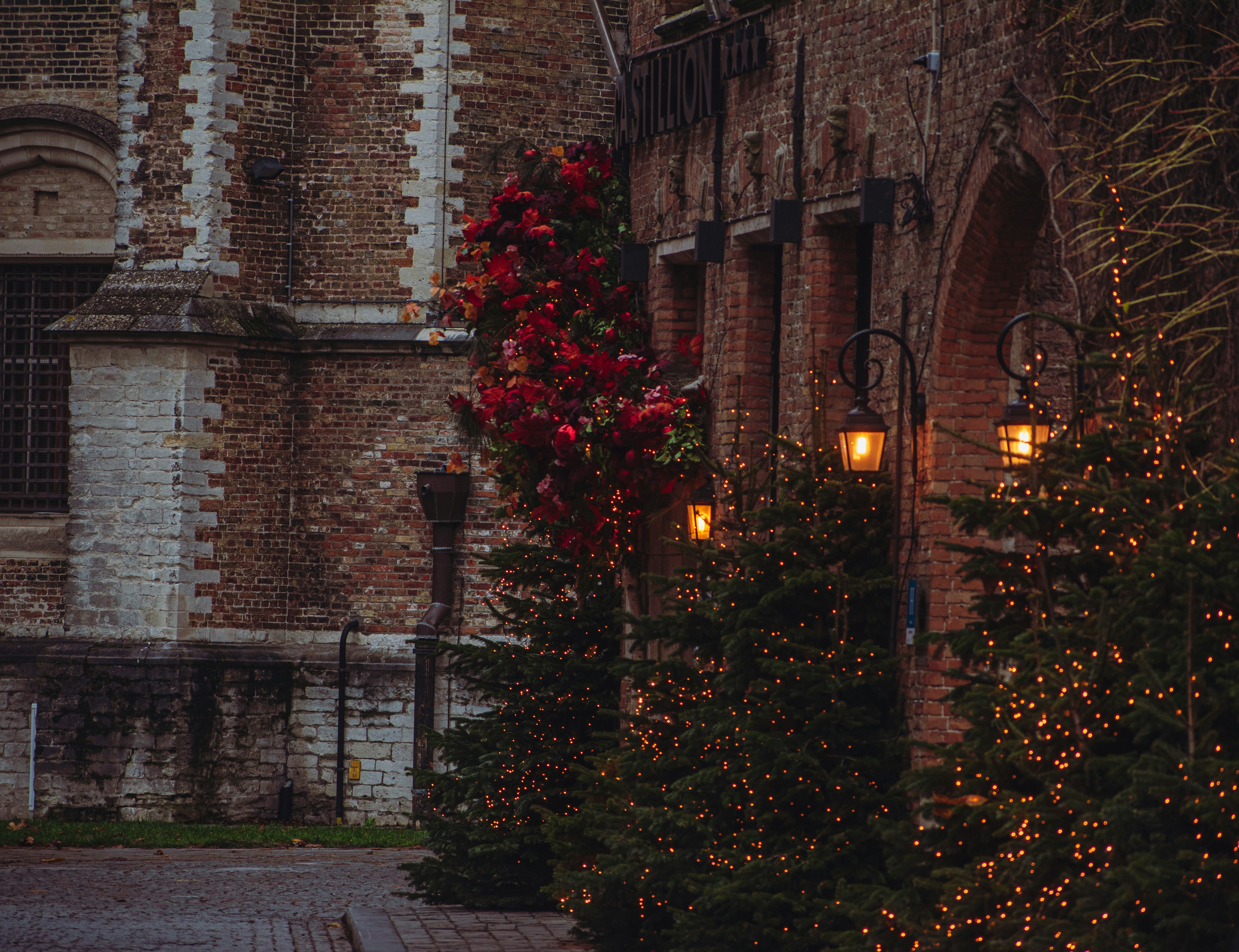 Holiday Lanterns lining a brick alley
