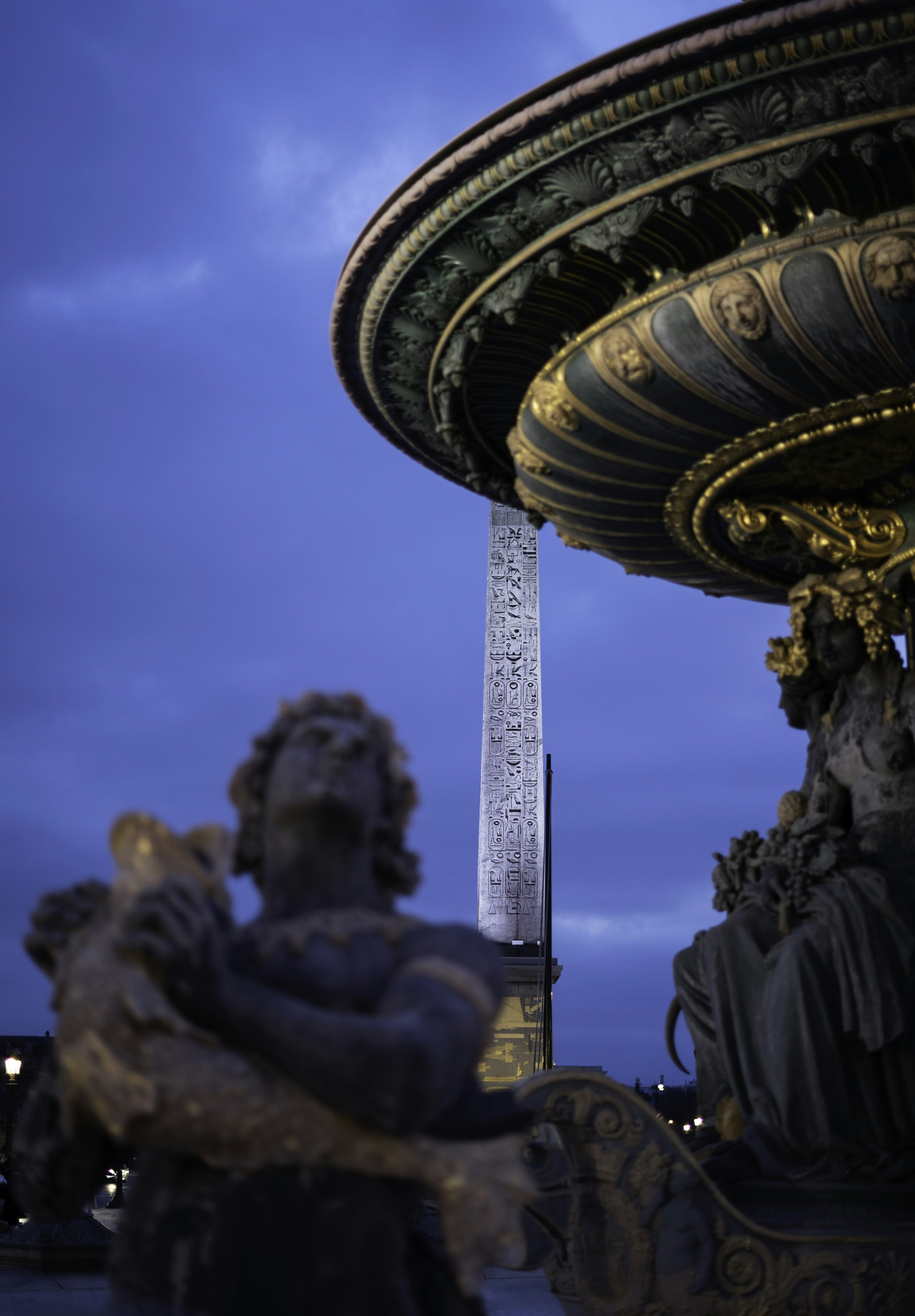 Blue Hour Obelisk Framed by an Ornate Canopy