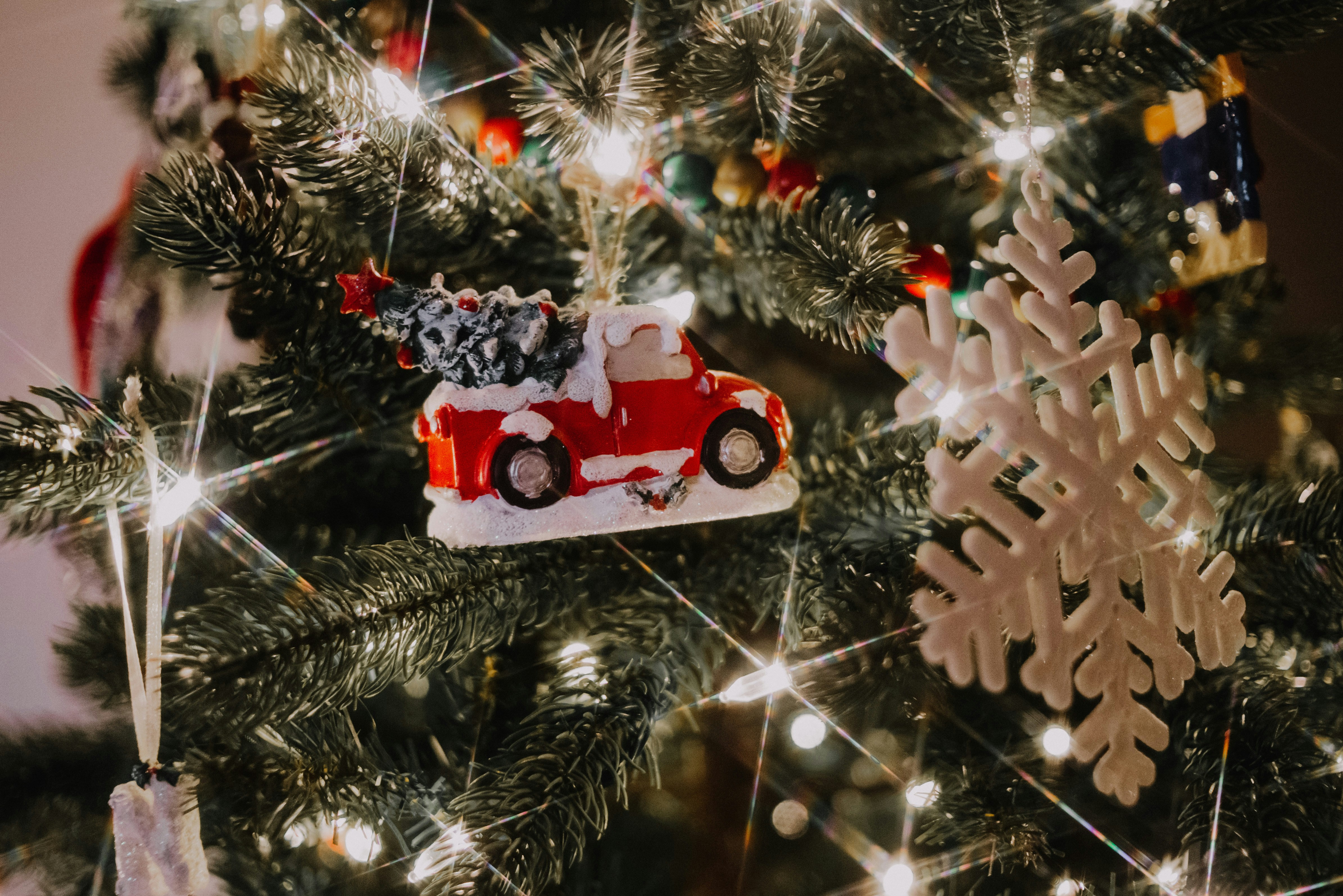 Mini Red Truck Ornament Anchored by Starry Christmas Lights