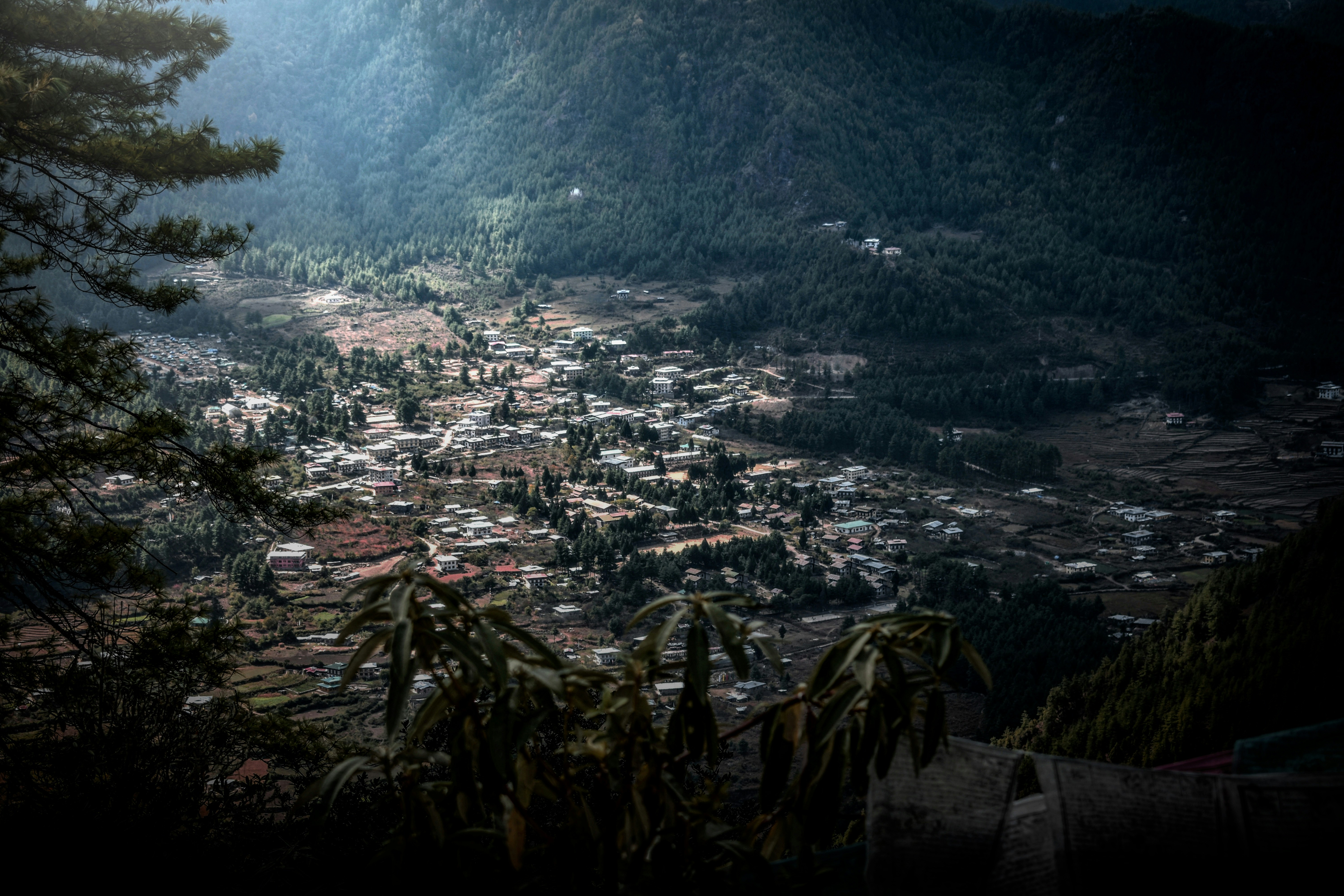 a view of a village in the mountains