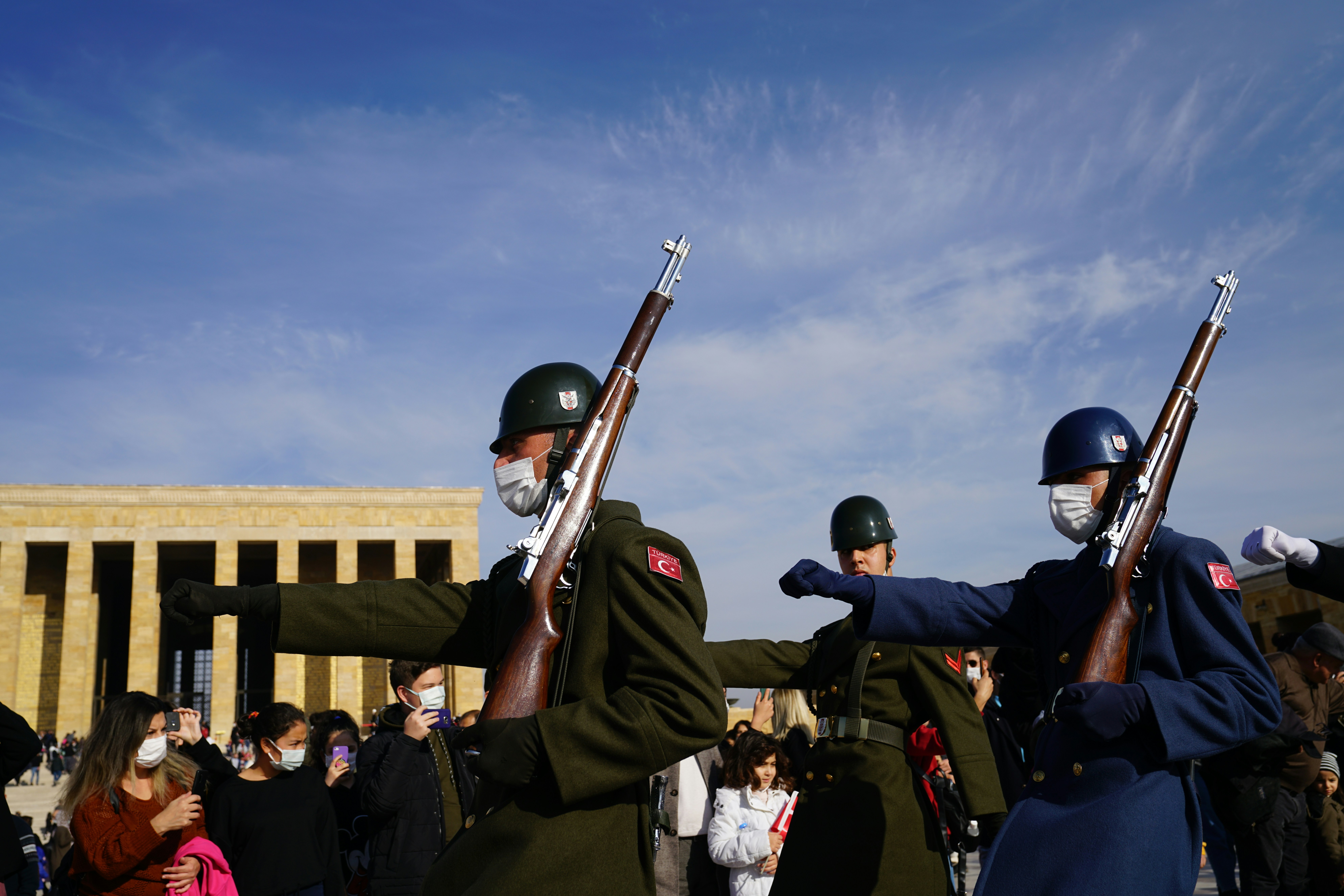 A group of men in uniforms holding guns photo – Free Türkiye Image on ...