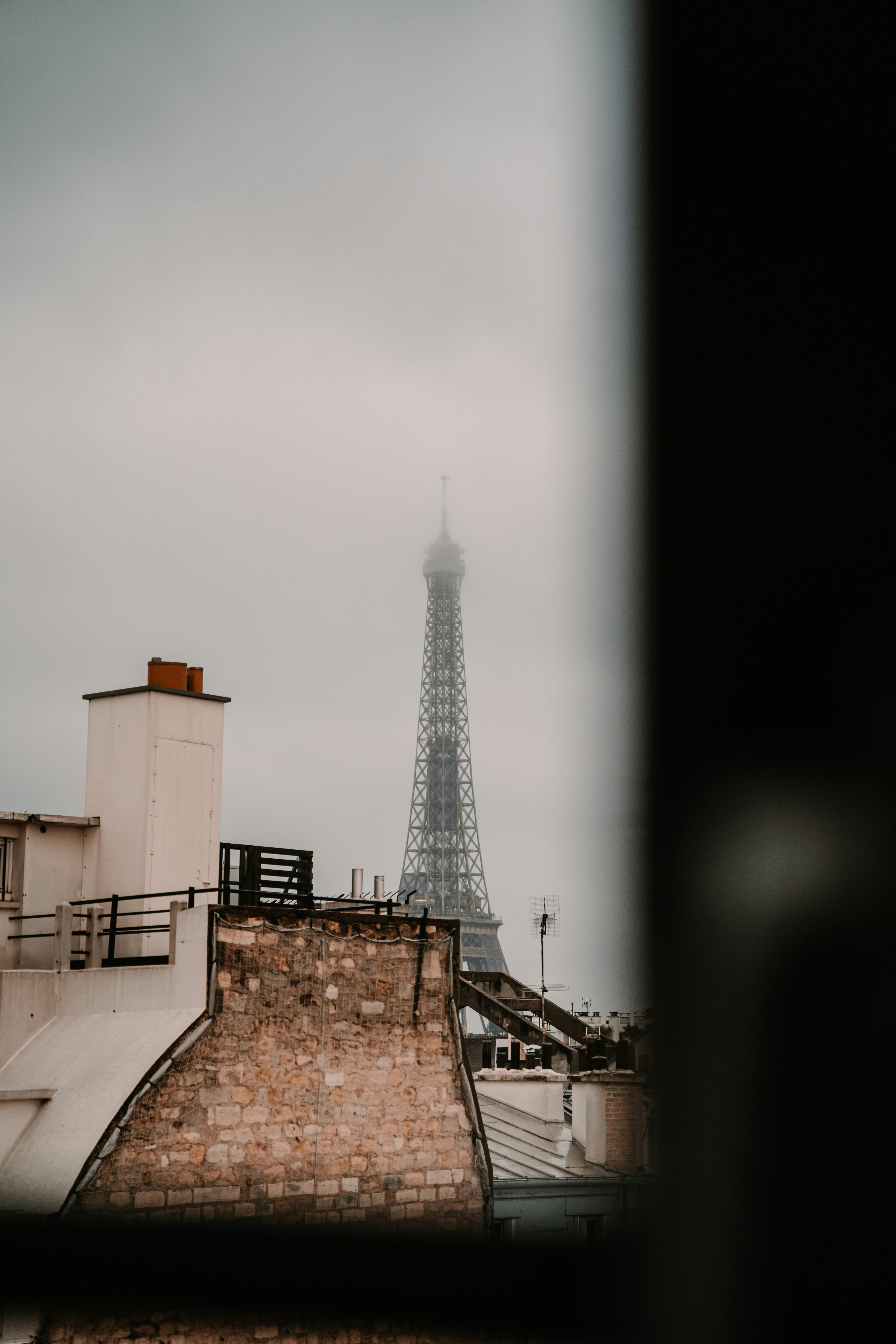 A view of the eiffel tower through a window photo – Free France Image ...