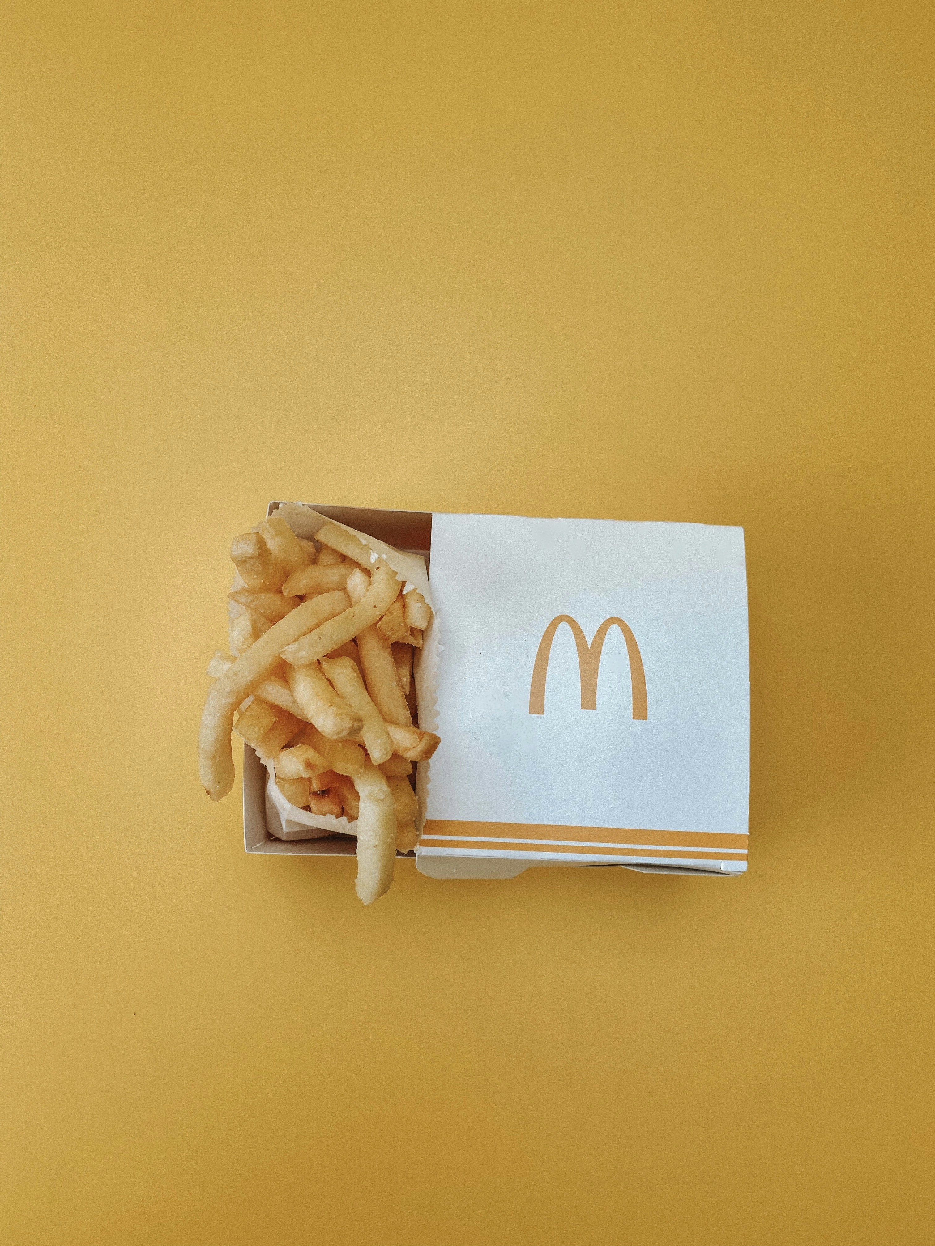 A box of french fries with a mcdonald's logo on it photo – Free Food ...