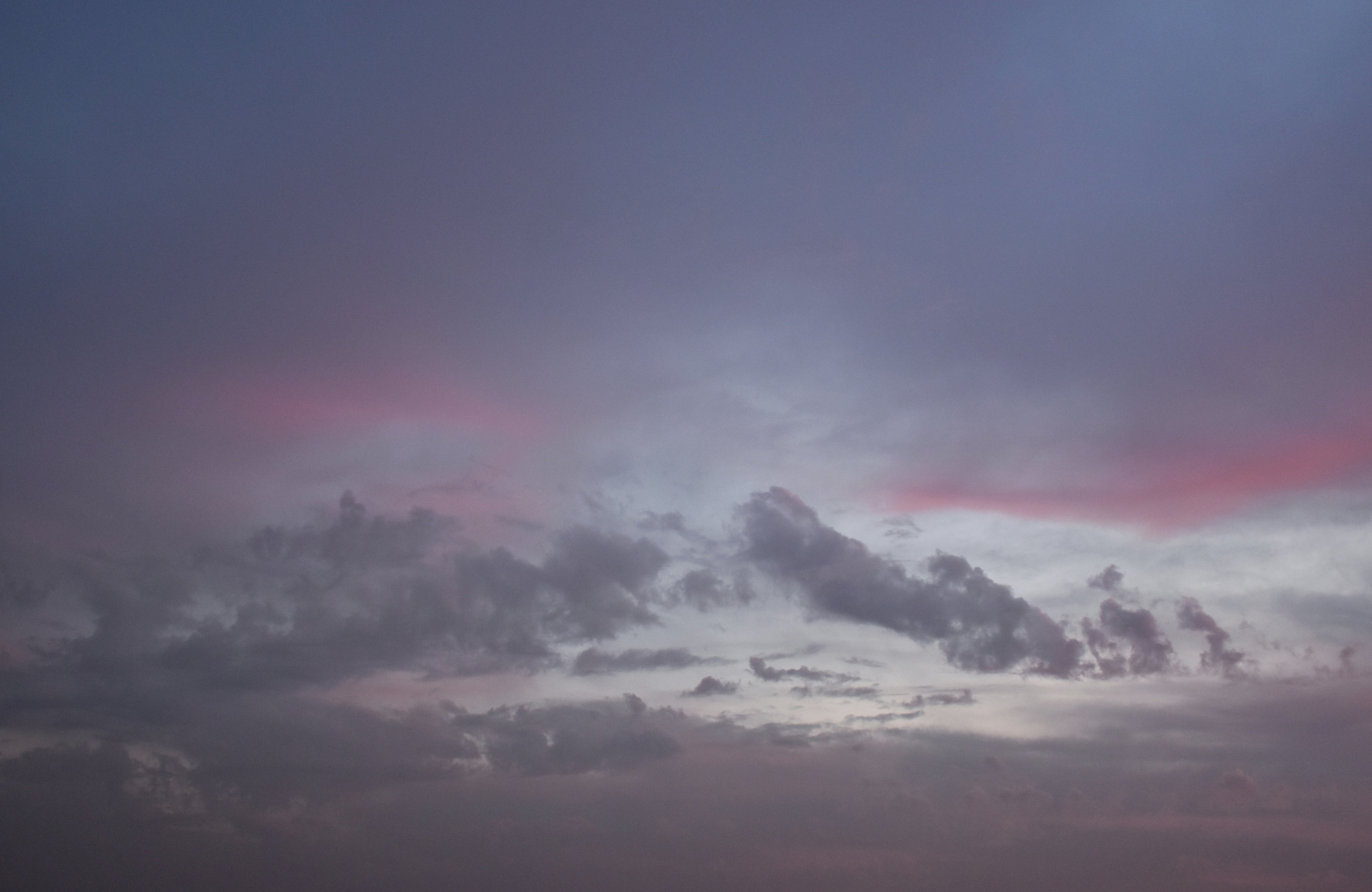 A cloudy sky with pink and blue clouds photo – Free Sky Image on Unsplash