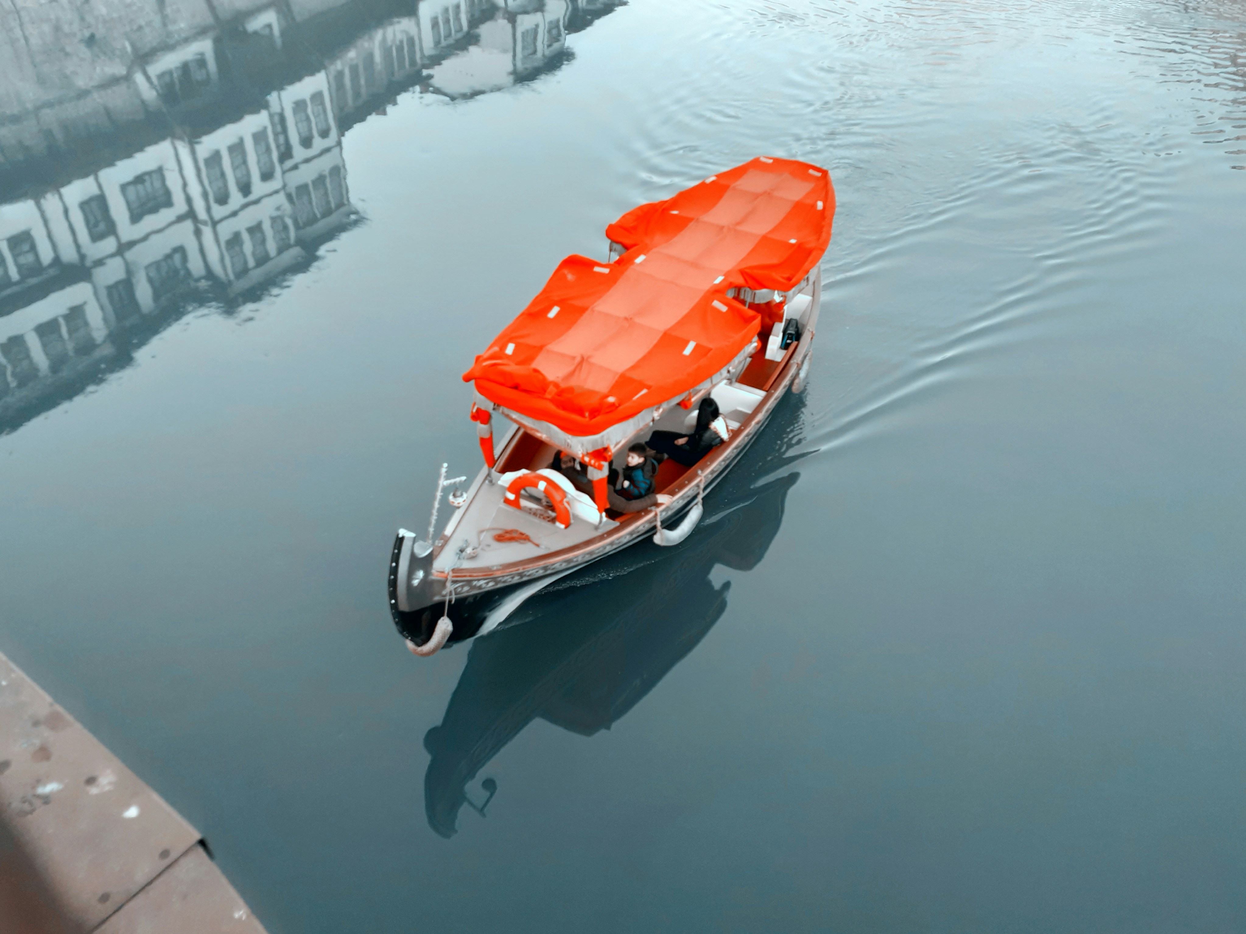 Crimson Canopy Glide: A Quiet Canal Moment