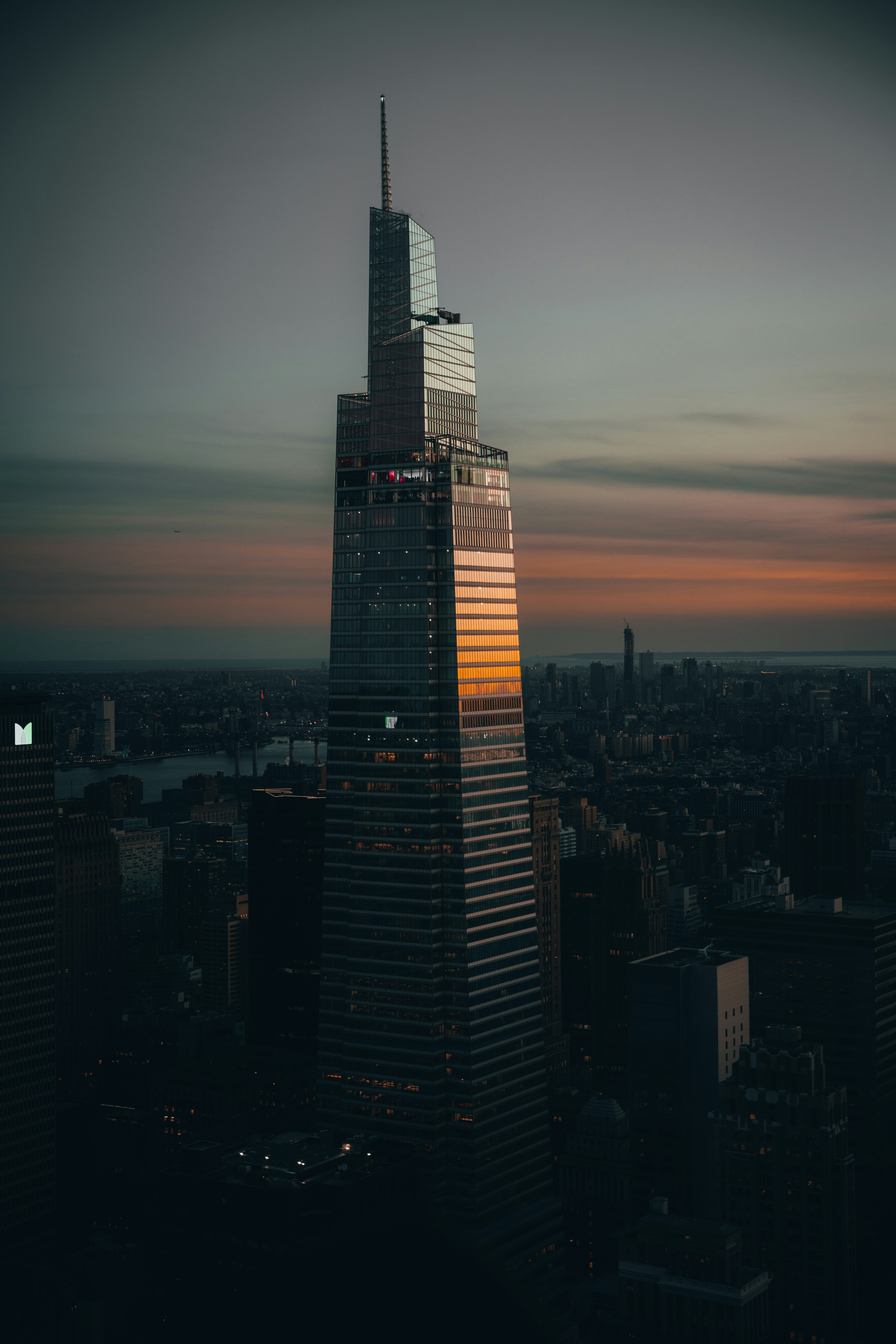 Dusk Crown: Sunset Light Traces the Facade of a Monumental Skyline Spire