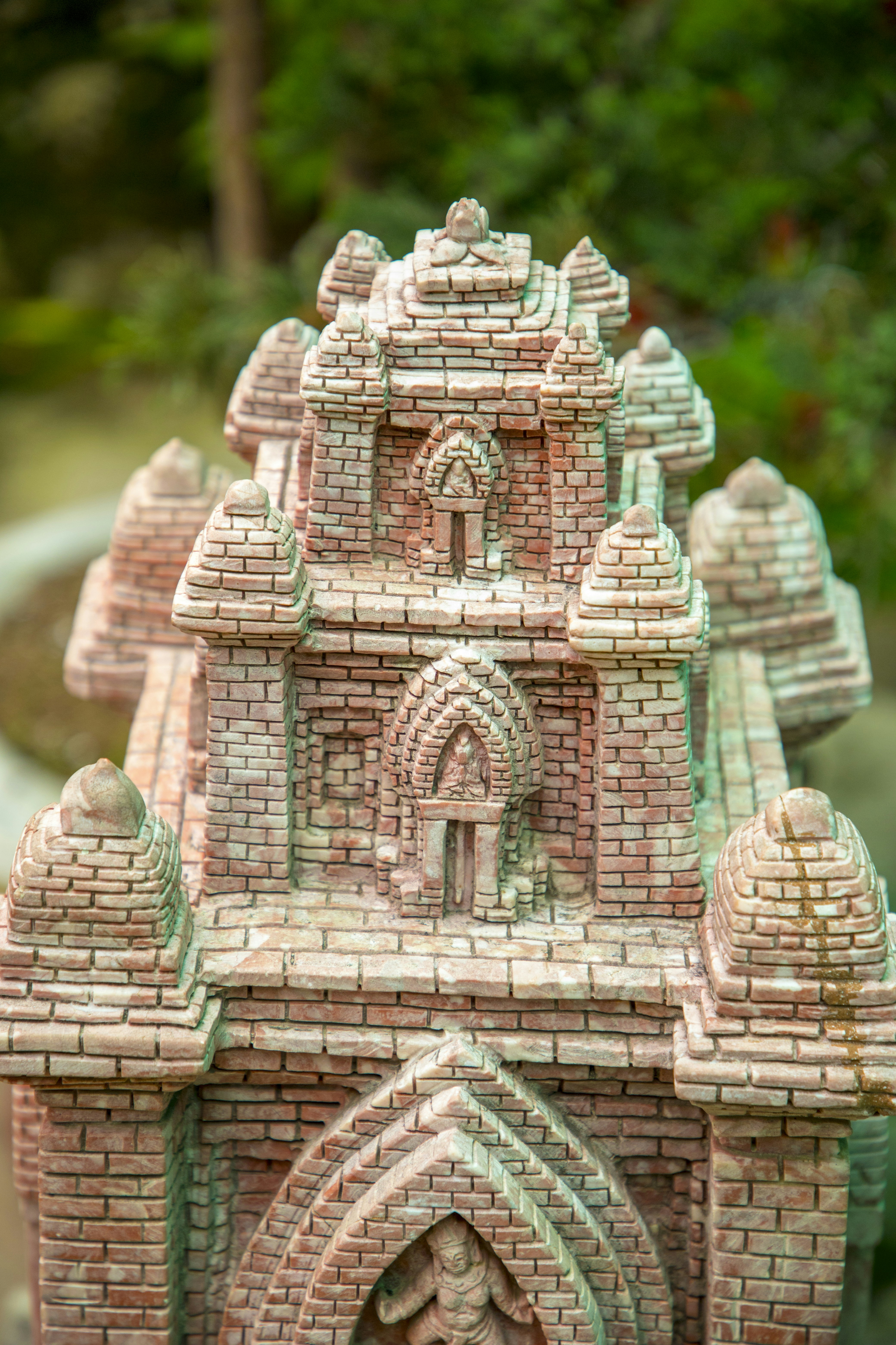 A Tiny Brick Citadel Reaches Toward Garden Light