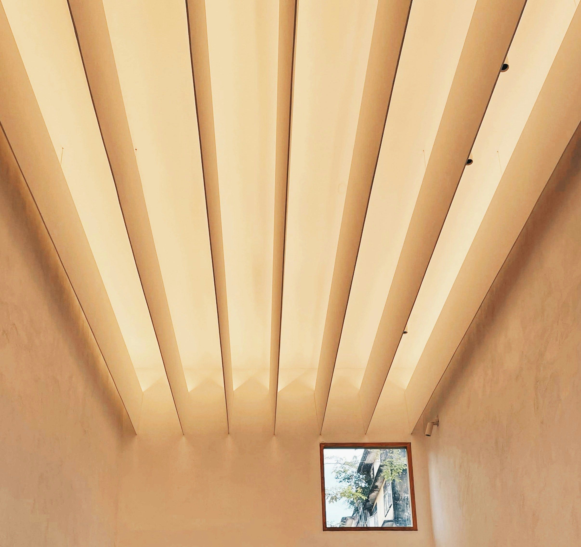 Ceiling Lines Converge: A Minimal Interior Spotlight