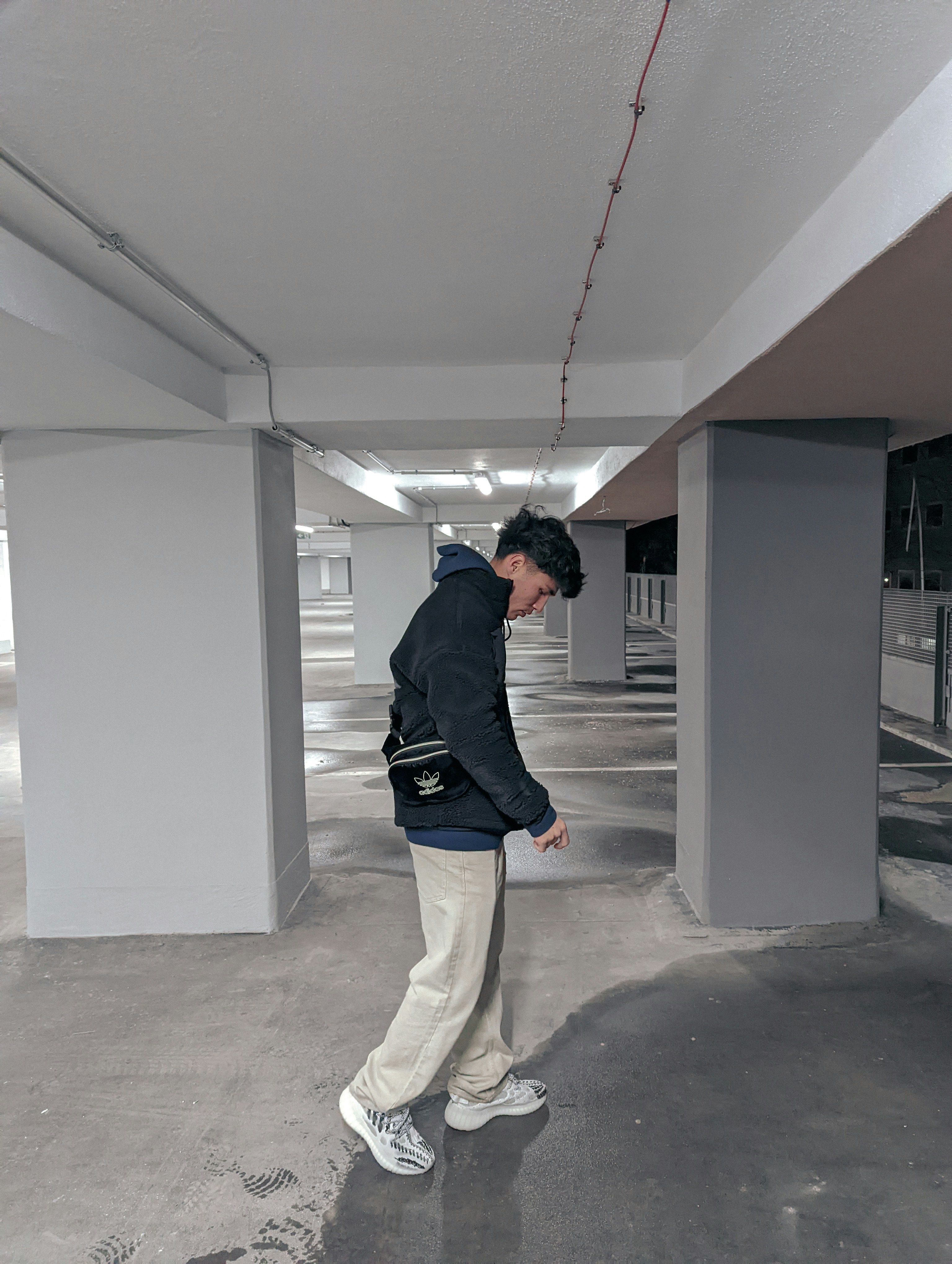 Urban Solitude: A Moment in the Shadows