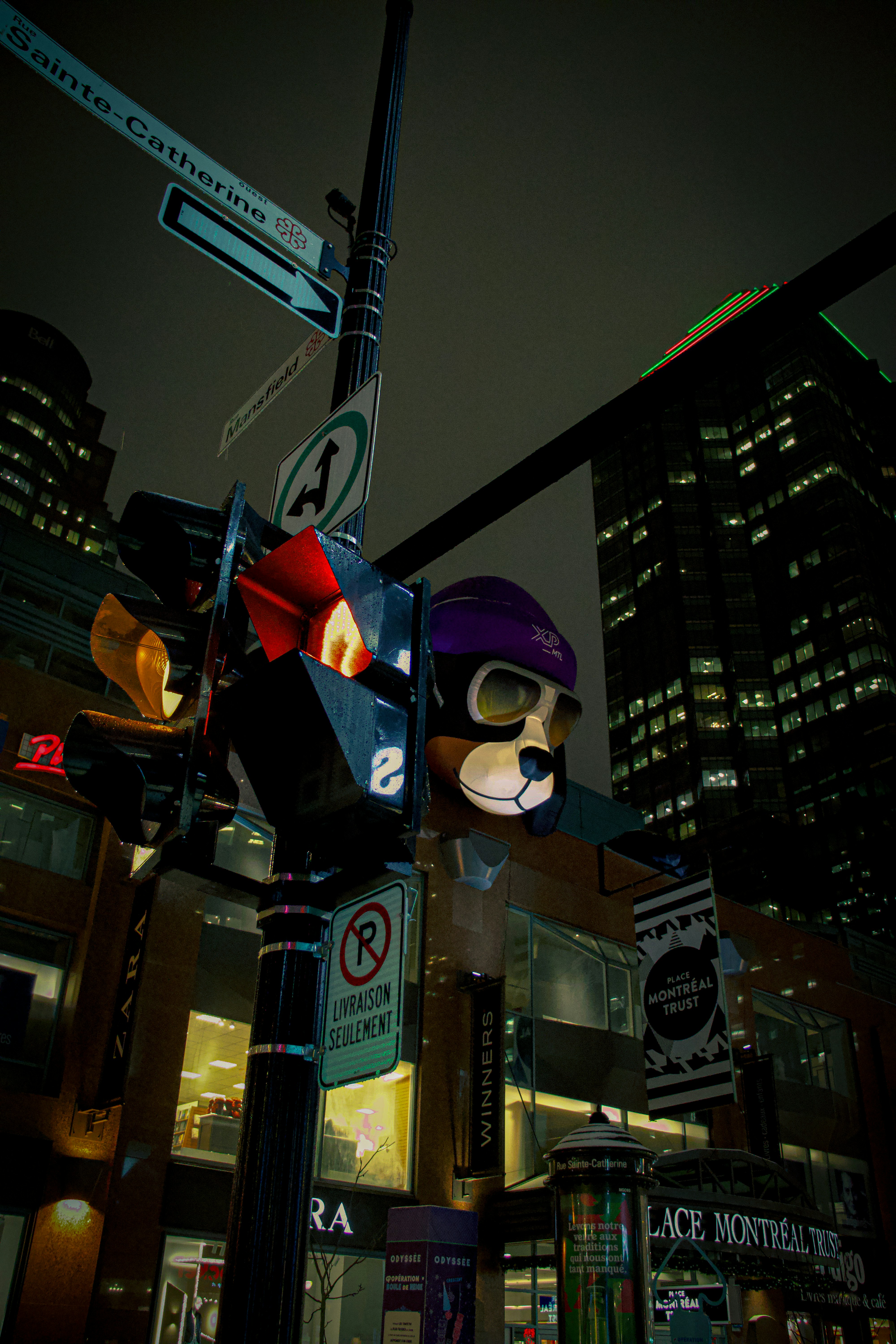 A traffic light with a stuffed animal on top of it photo – Free Traffic ...