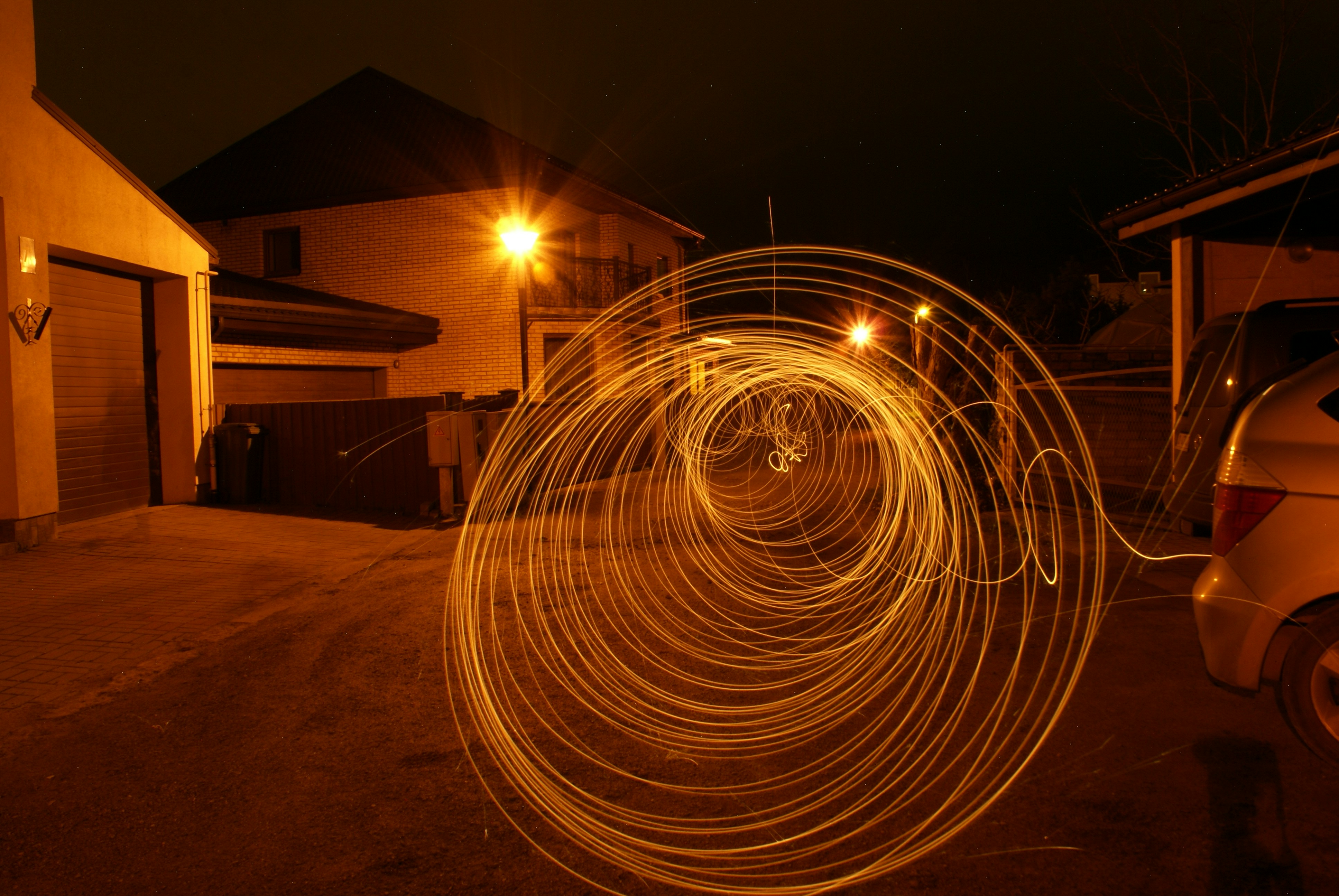 Spiral Light Dance in a Quiet Suburban Night
