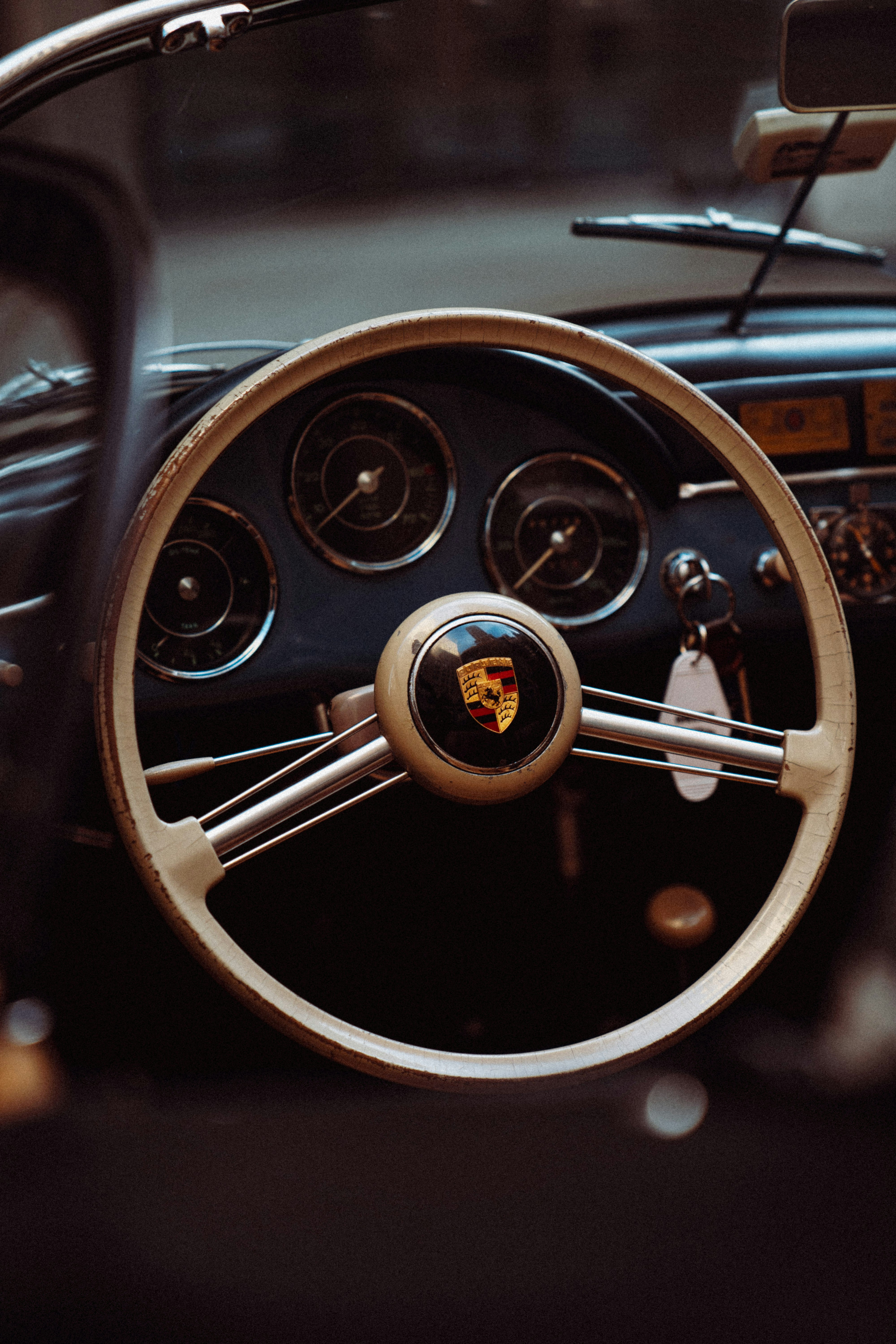 A steering wheel and dashboard of a car photo – Free Stearing wheel ...