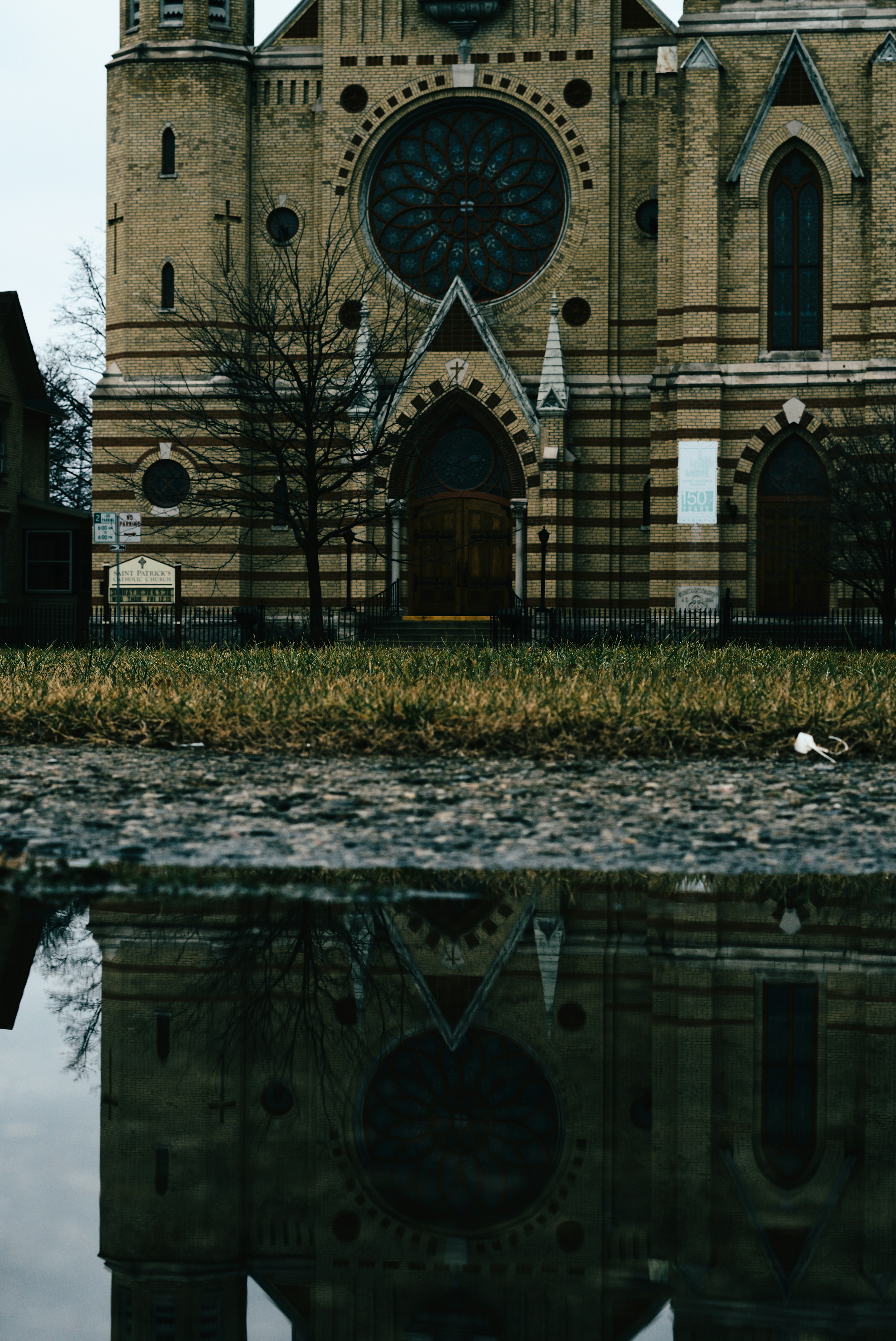 Gothic Church Facade Rising from Still Waters