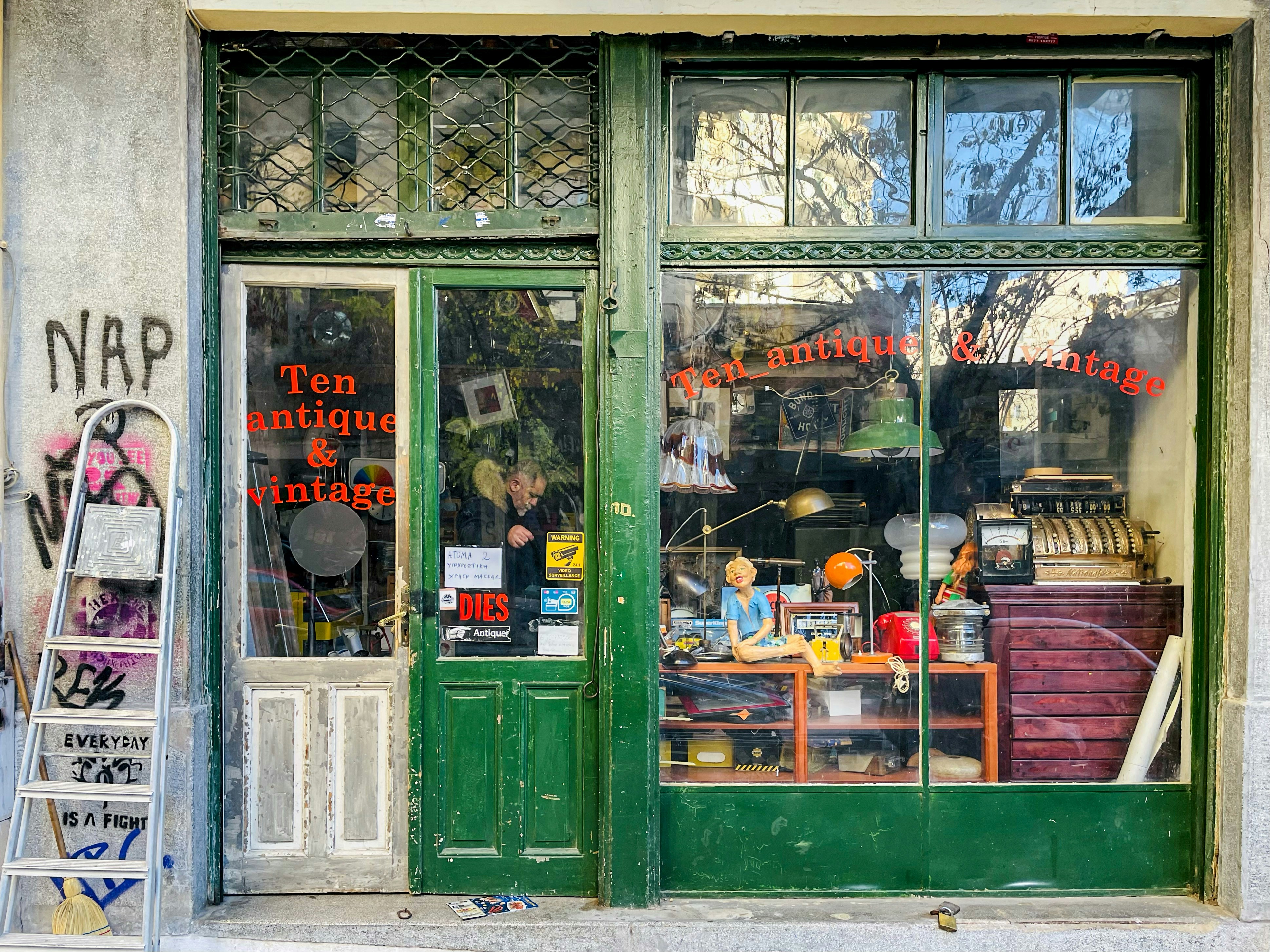 Charming Vintage Storefront with Green Accents