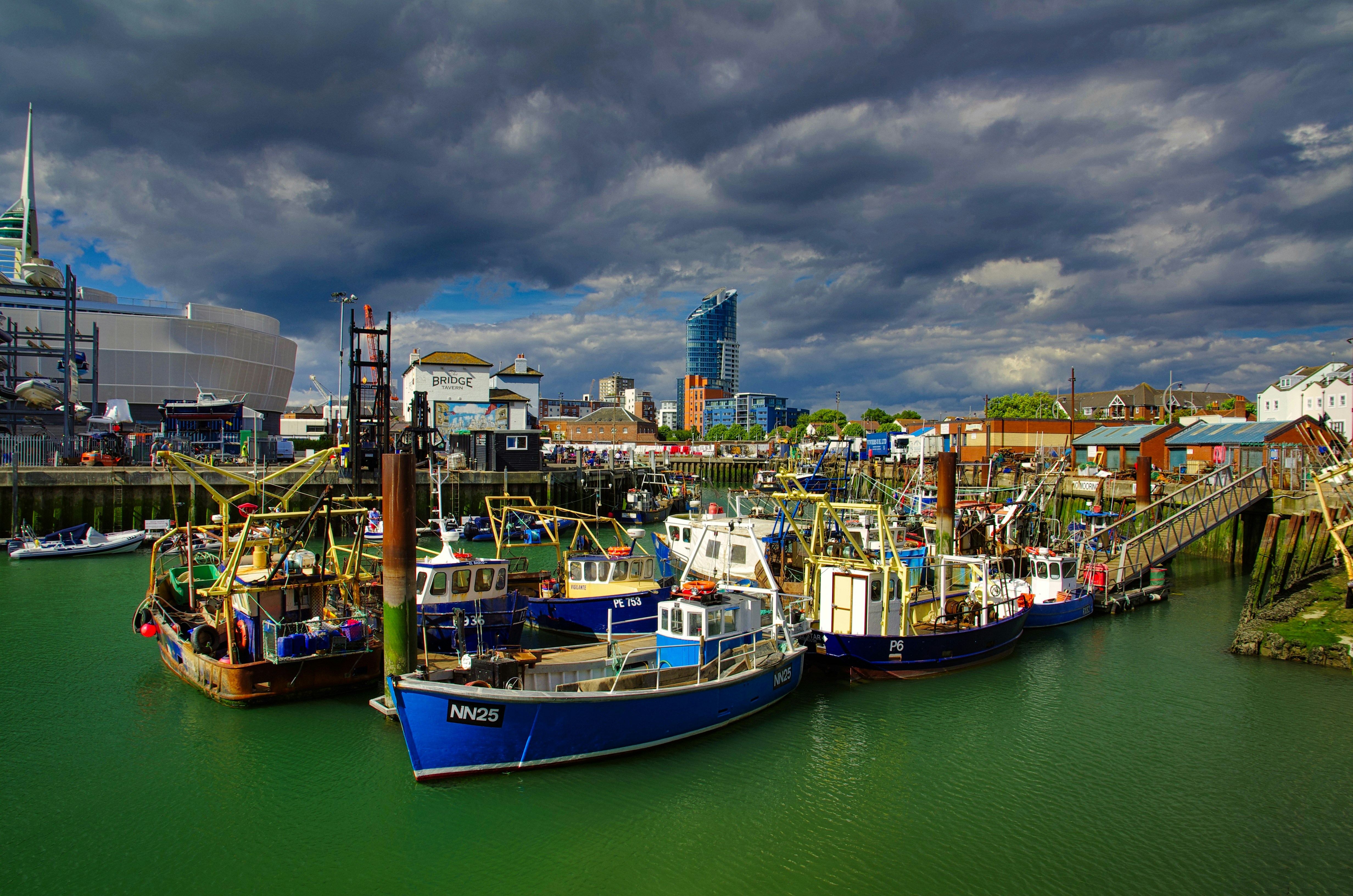A group of boats that are sitting in the water photo – Free Portsmouth ...