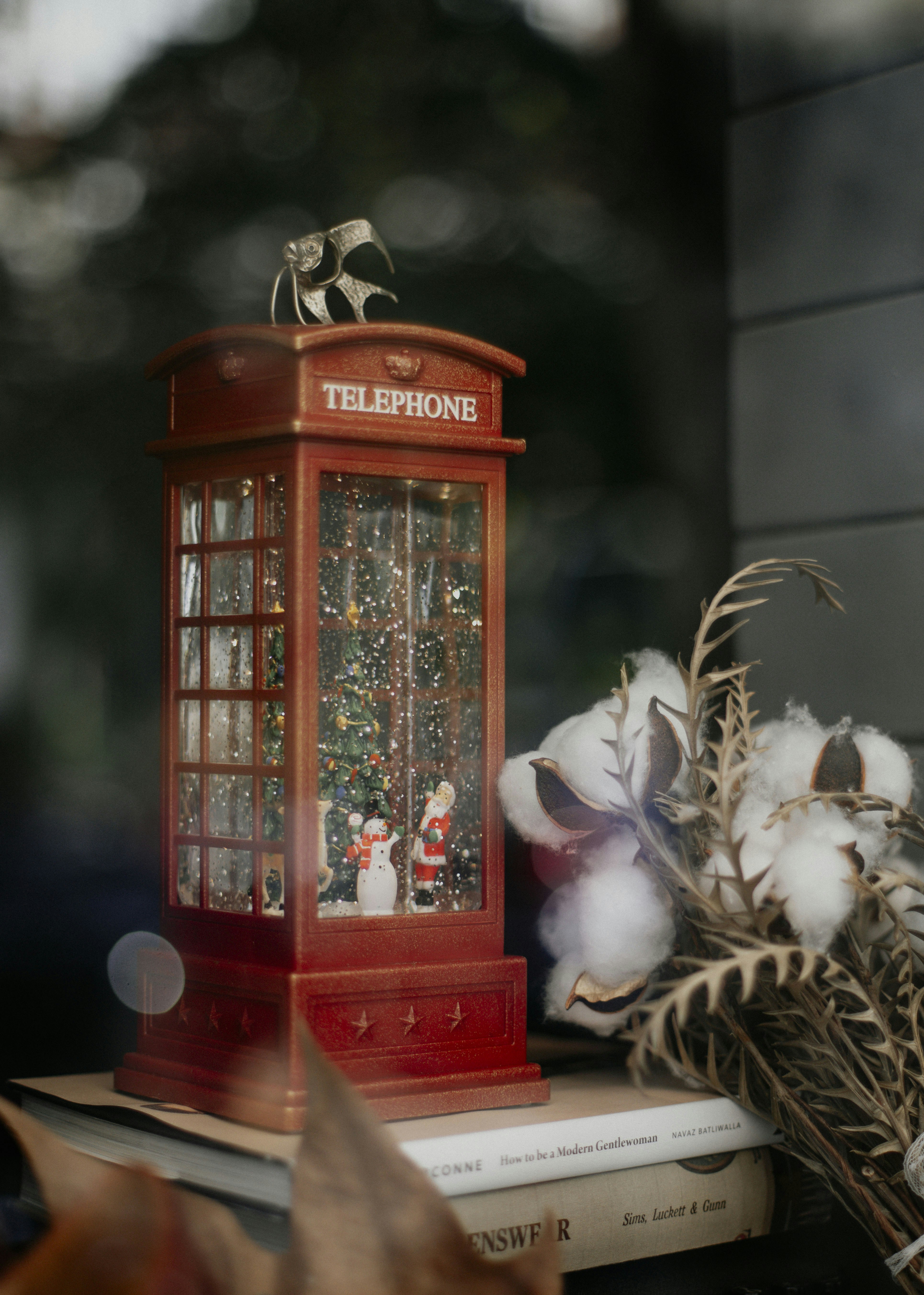 A telephone booth with cotton in front of it photo – Free Chirstmas ...
