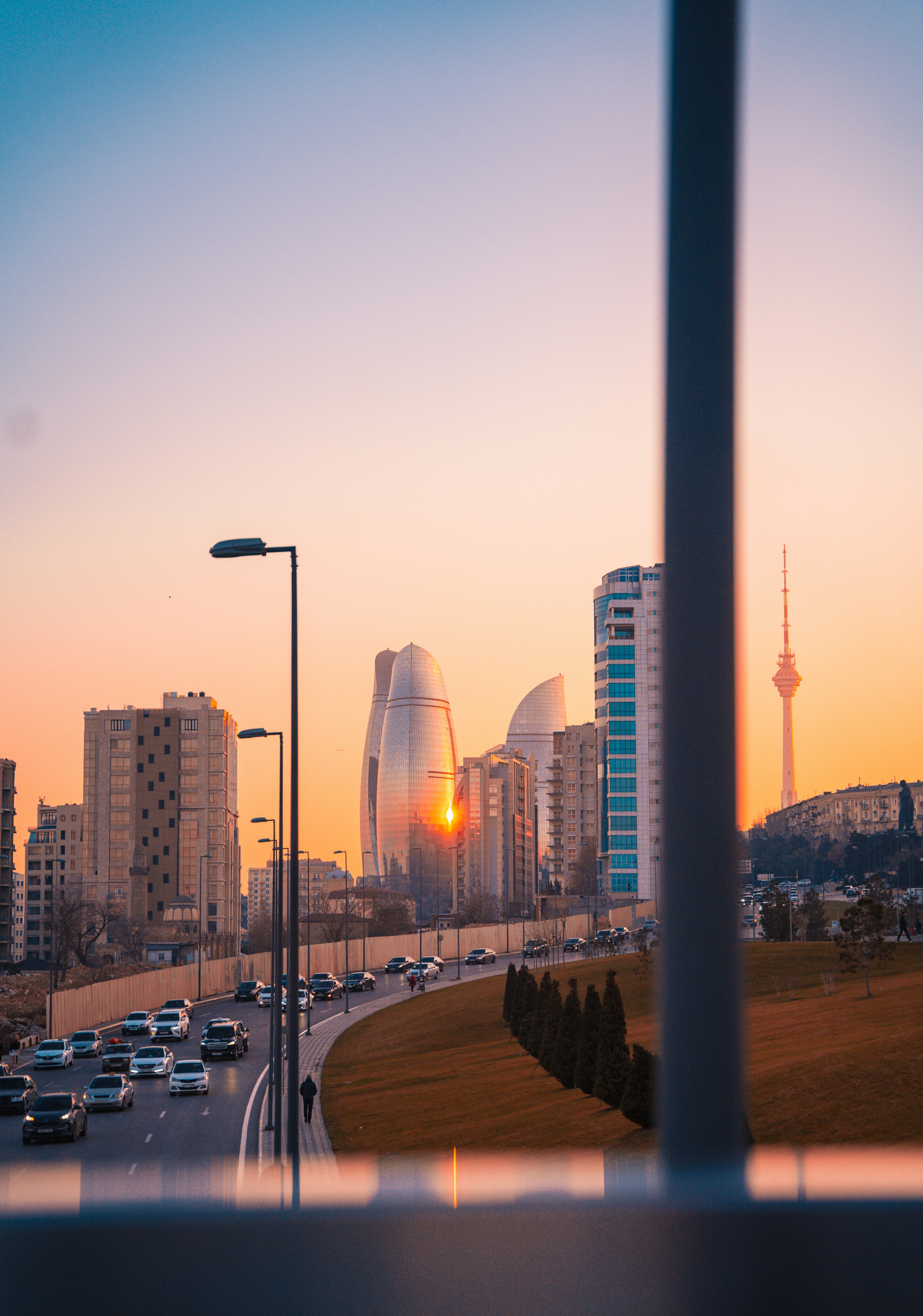 A view of a city from a window at sunset photo – Free Baku Image on ...
