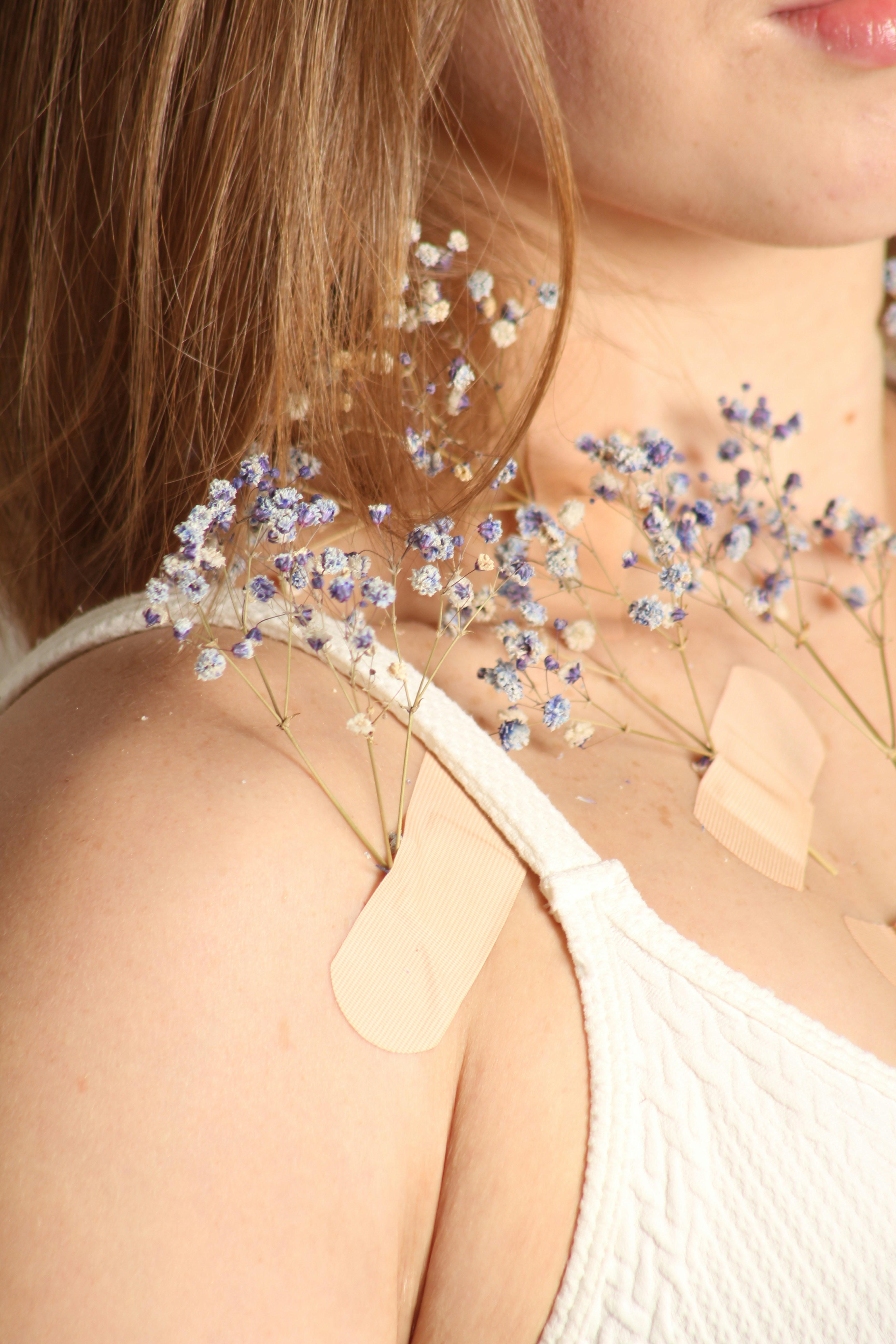 Lavender Fronds Draped Over a Sunlit Shoulder