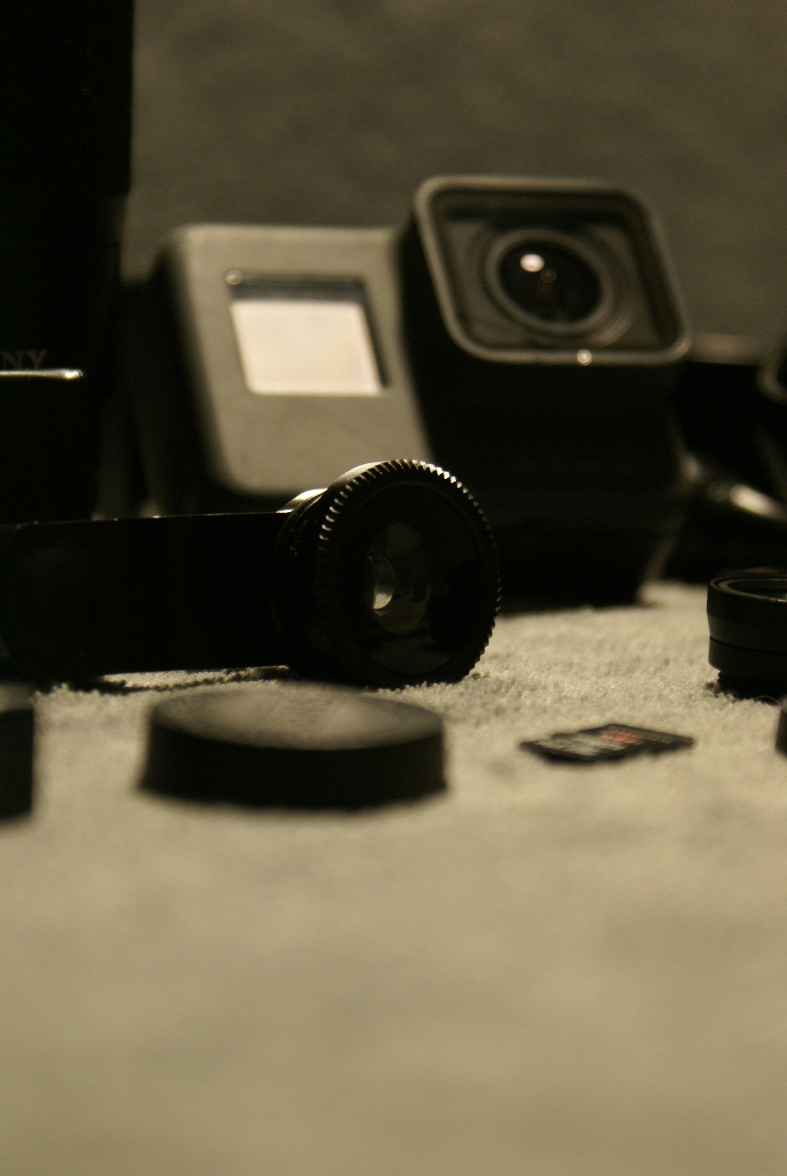 A group of cameras sitting on top of a table photo – Free Gopro Image ...