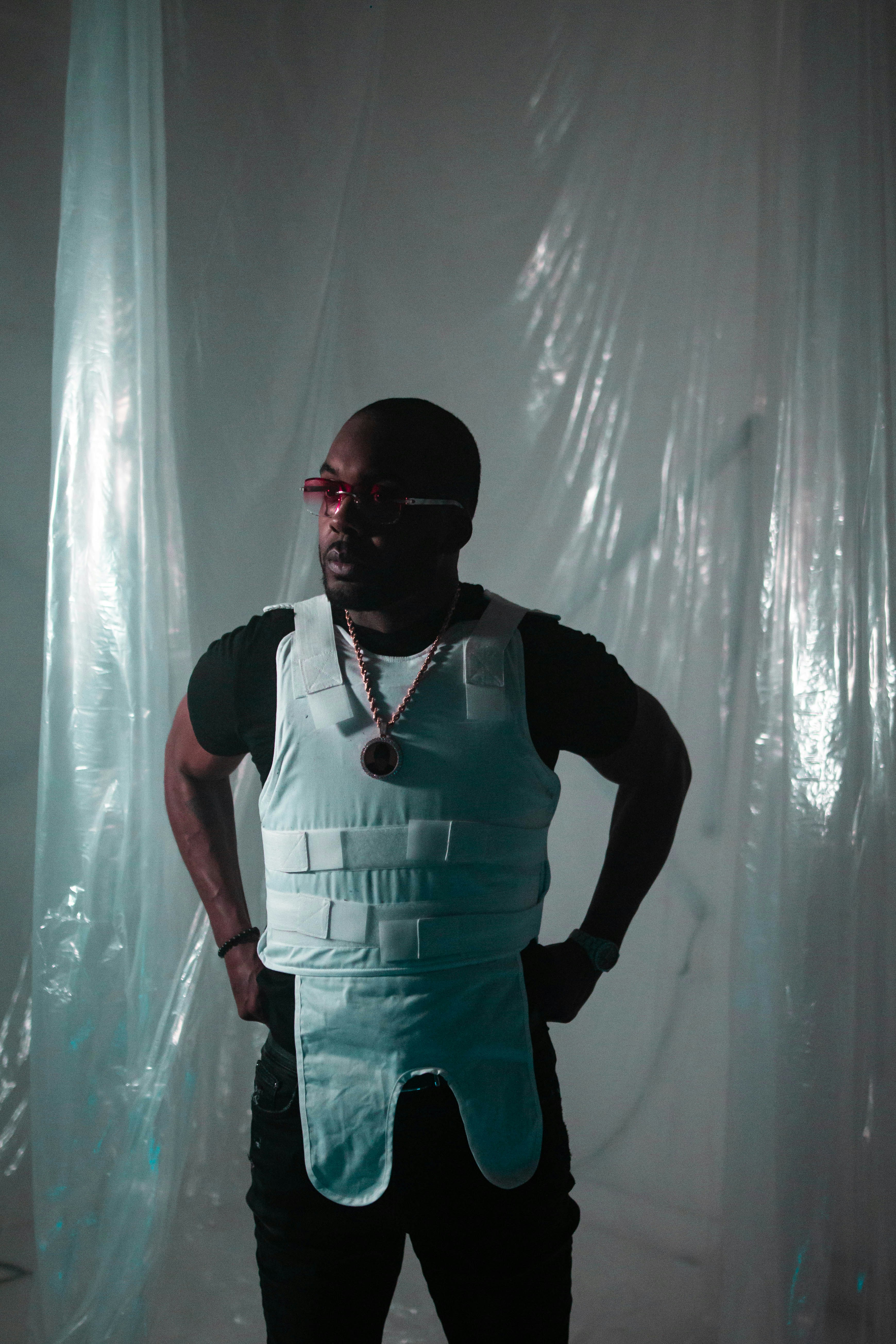 Blue Armor Under Plastic Veil: A Portrait of Quiet Authority