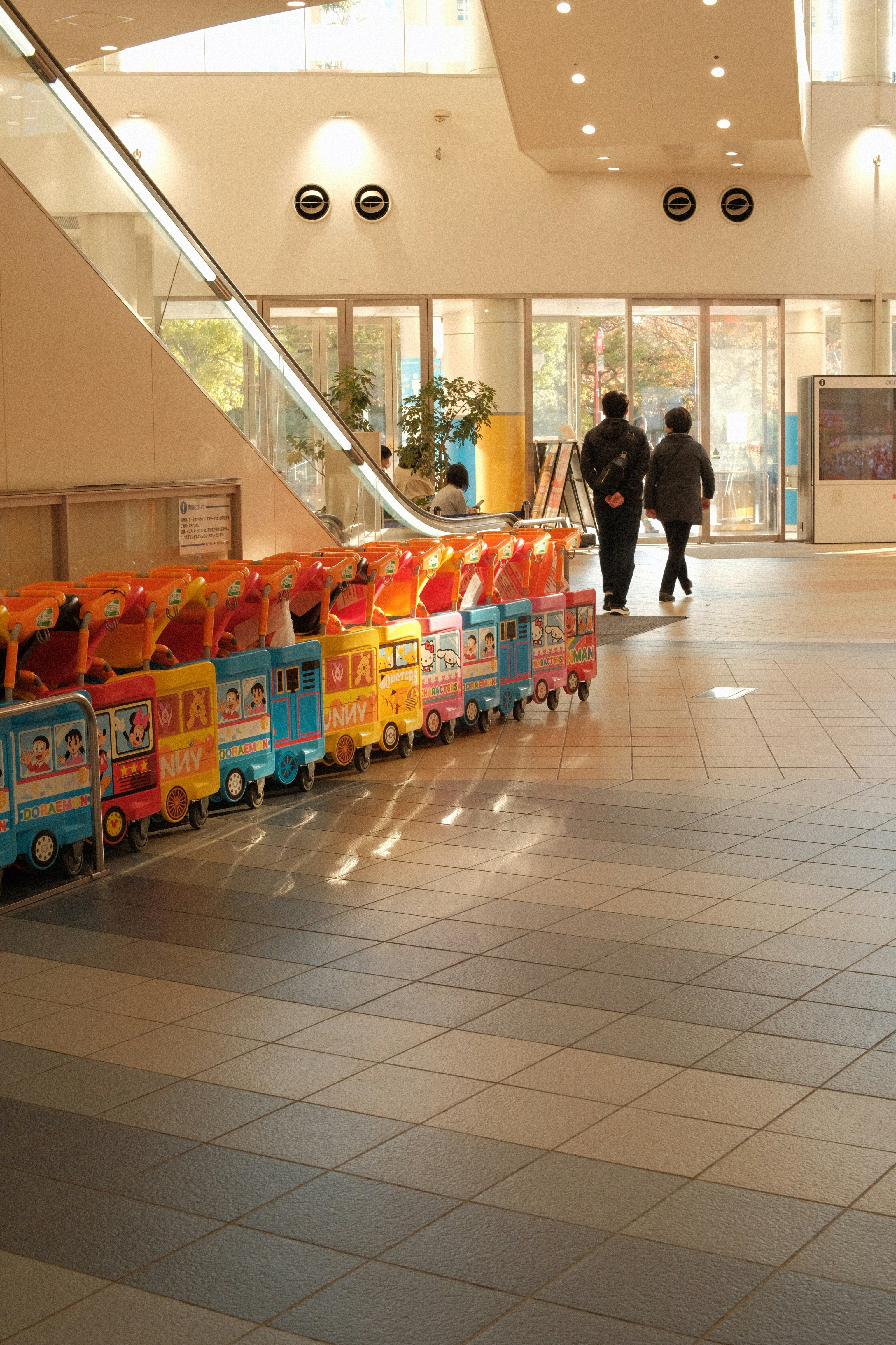 Playful Train Row in a Bright Mall Atrium