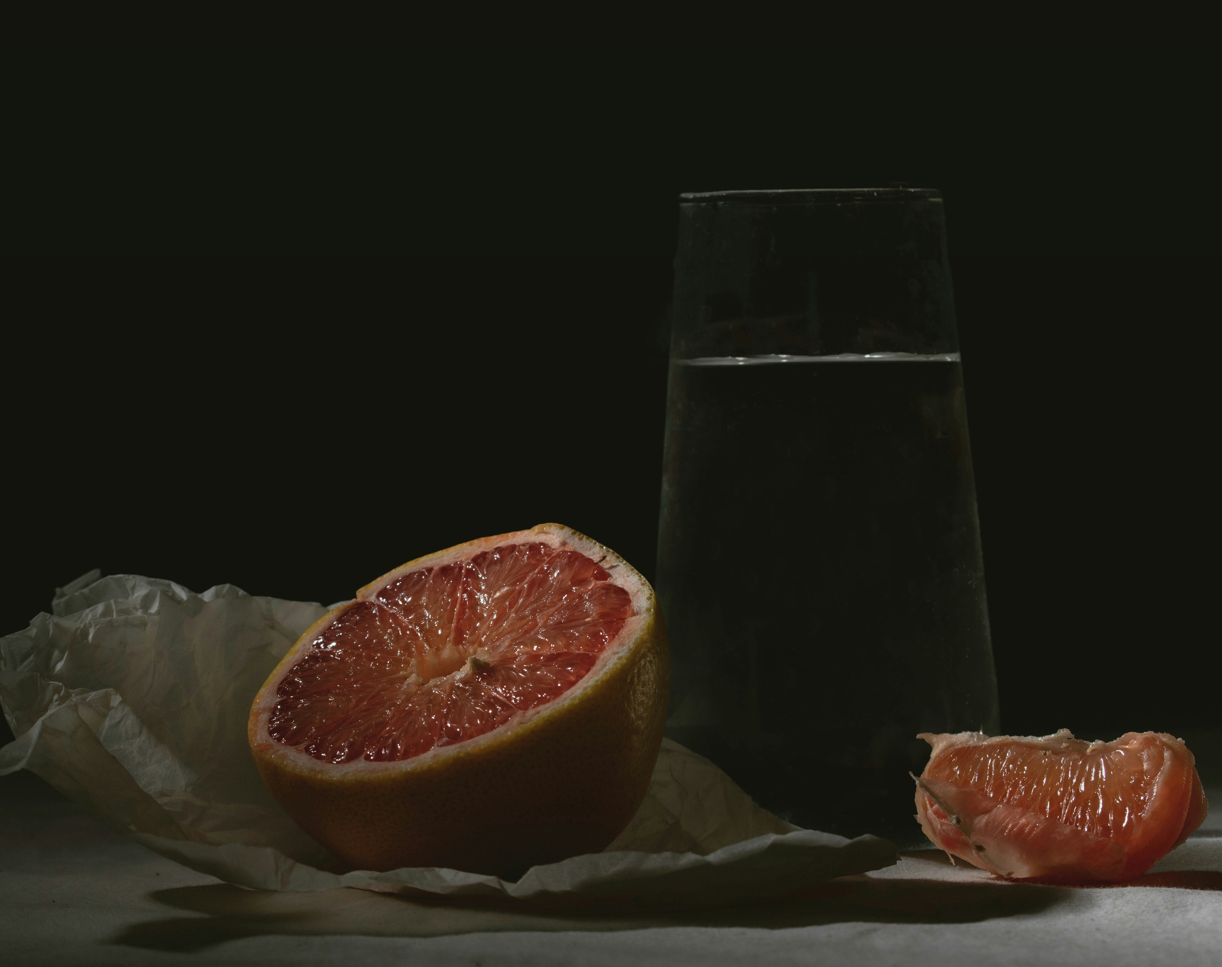 Citrus Quietude: Half-Sliced Ruby and Shadowed Glass