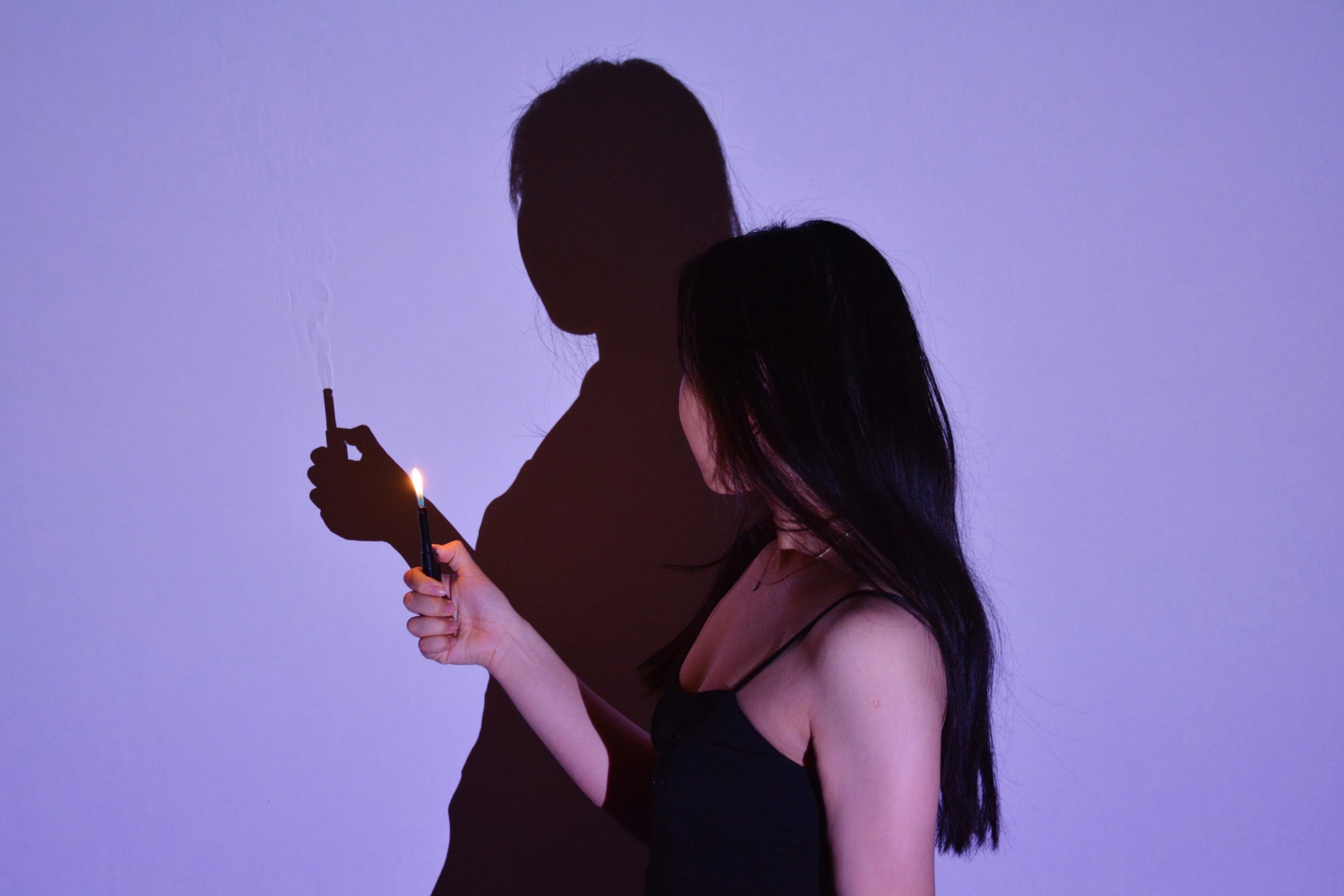 a woman holding a cell phone
