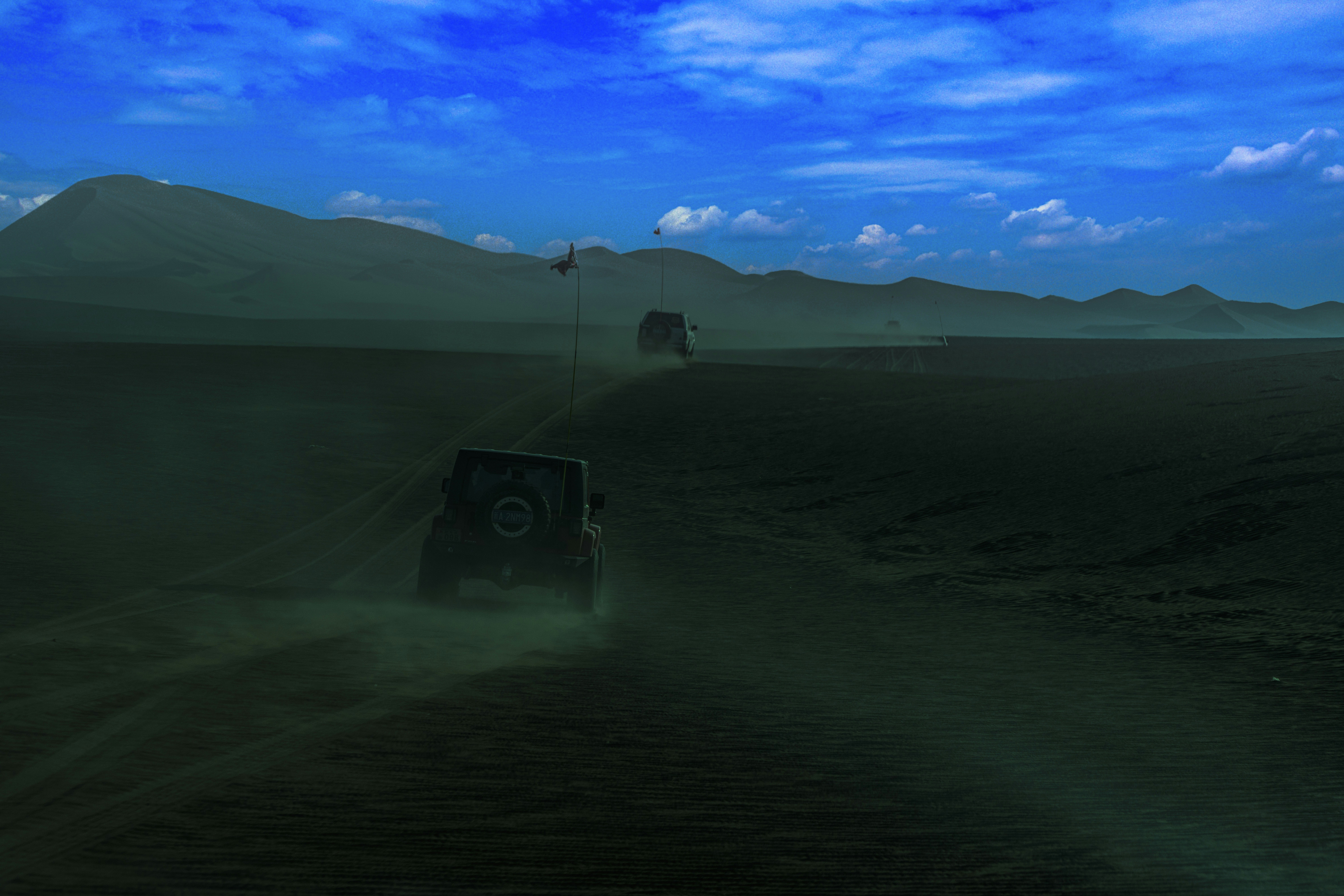 Dust and Dunes: A Jeep’s Quiet Conquest Through a Turquoise Veil