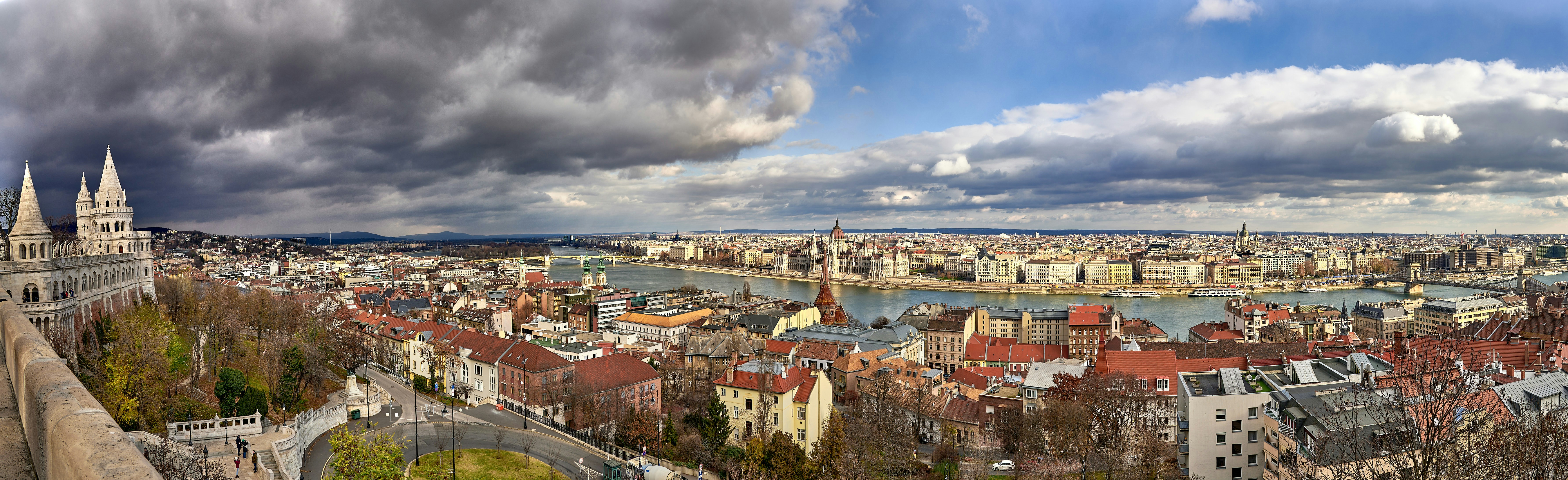 a panoramic view of a city and a river