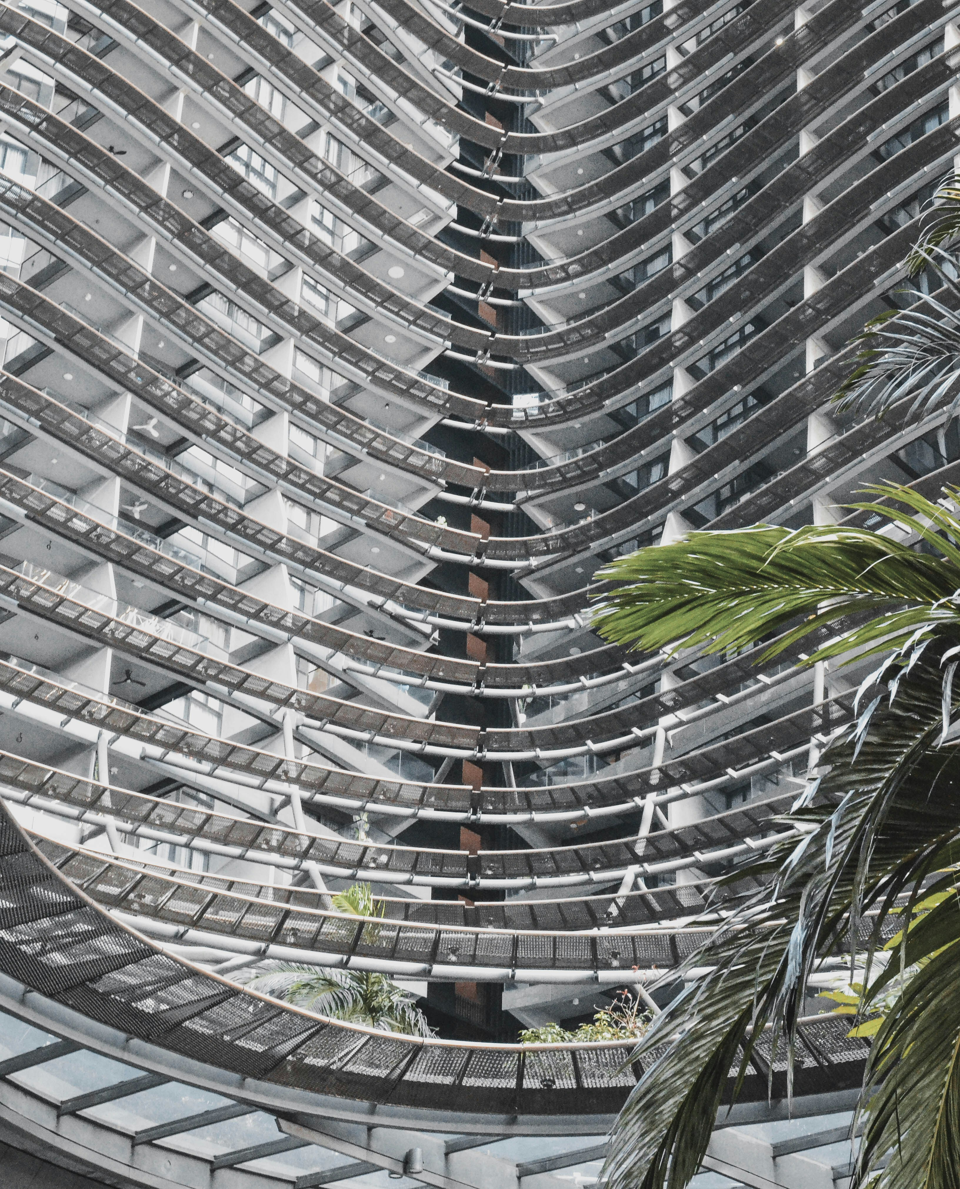 Concentric Ribbons: The Vertical Coil of a Modern Atrium