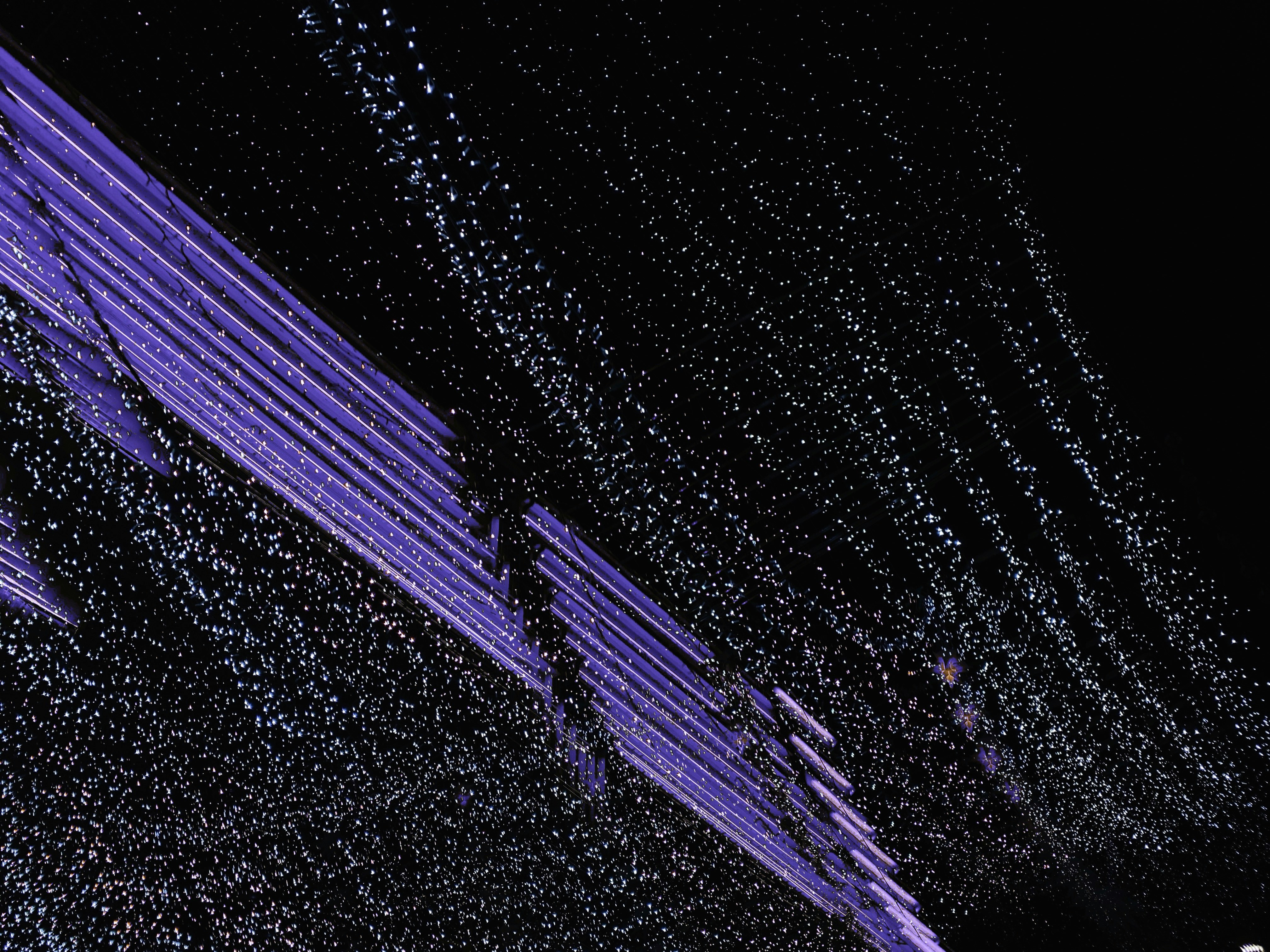Diagonals of Violet Light Across a Star-Dusted Night
