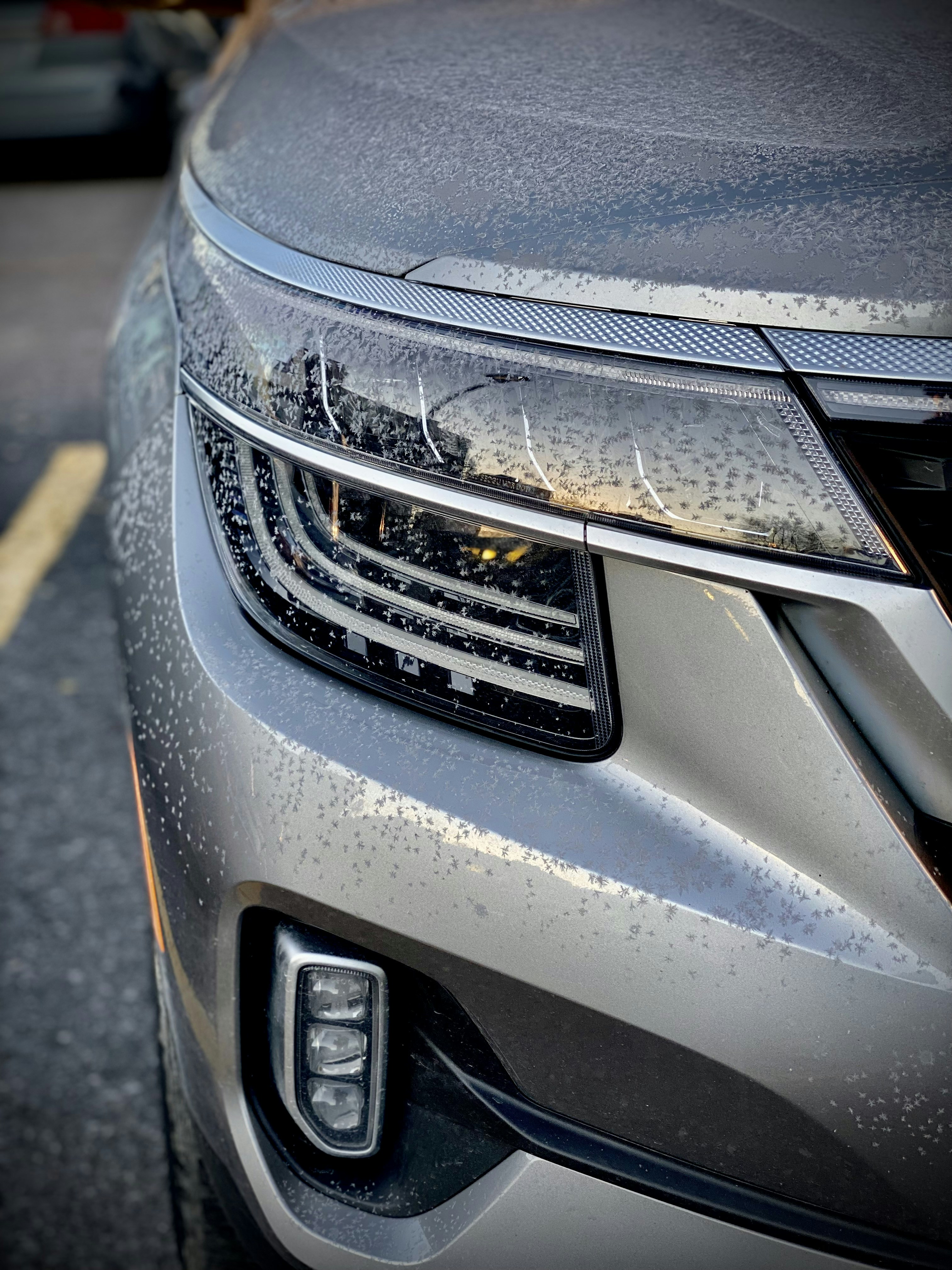 a close up of the front grille of a car