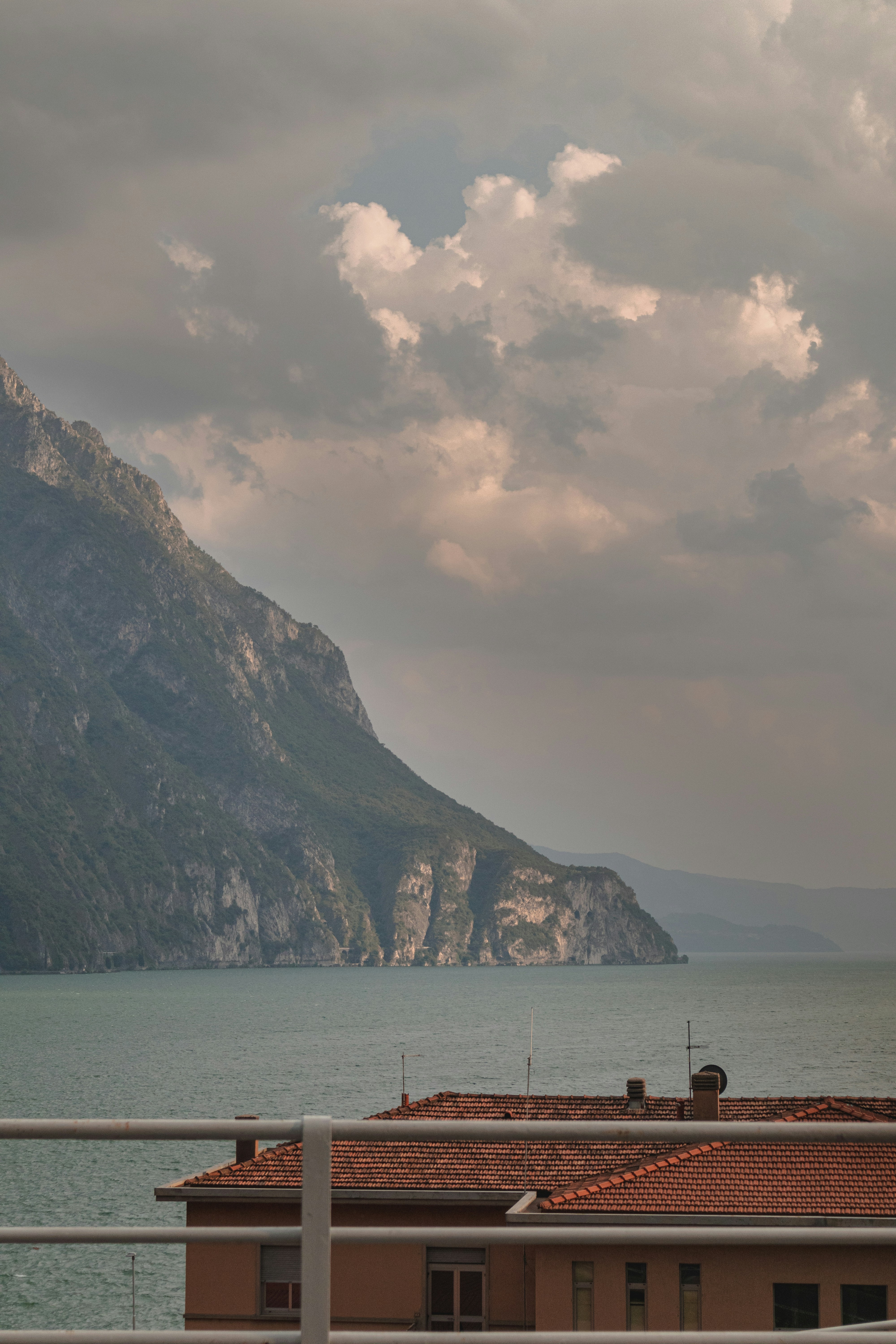 Cliffs and Red Roofs along a Quiet Sea Promontory